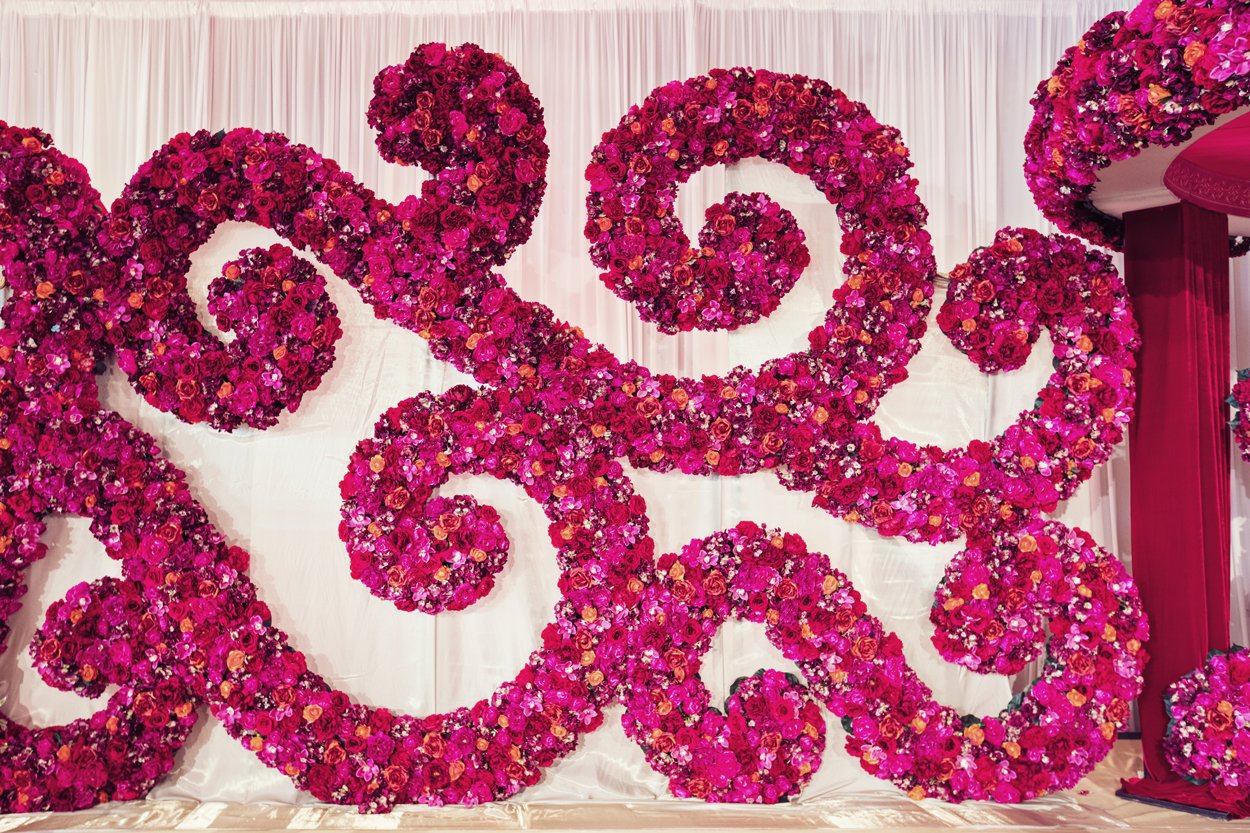 Vibrant Flowers in Scroll Pattern
