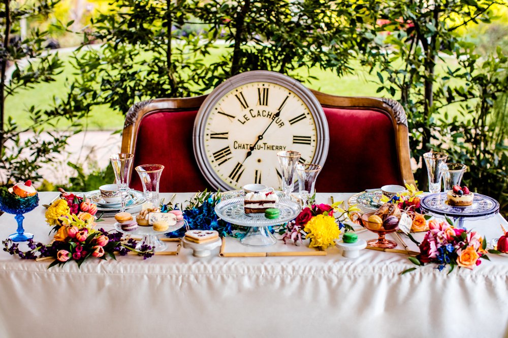Large Clock Placed on Velvet Couch