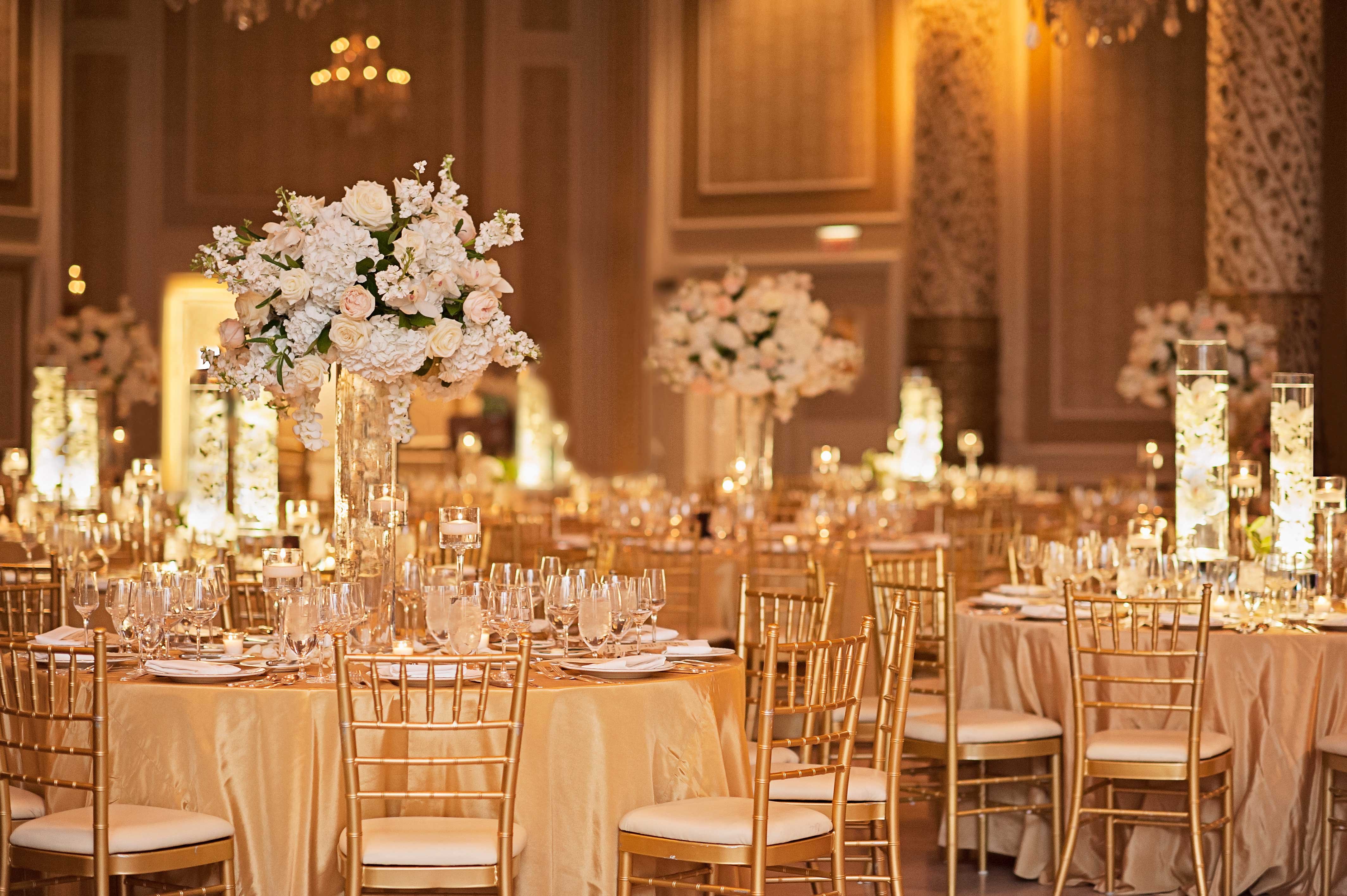 Gold Tablescapes with Tall Floral Arrangements