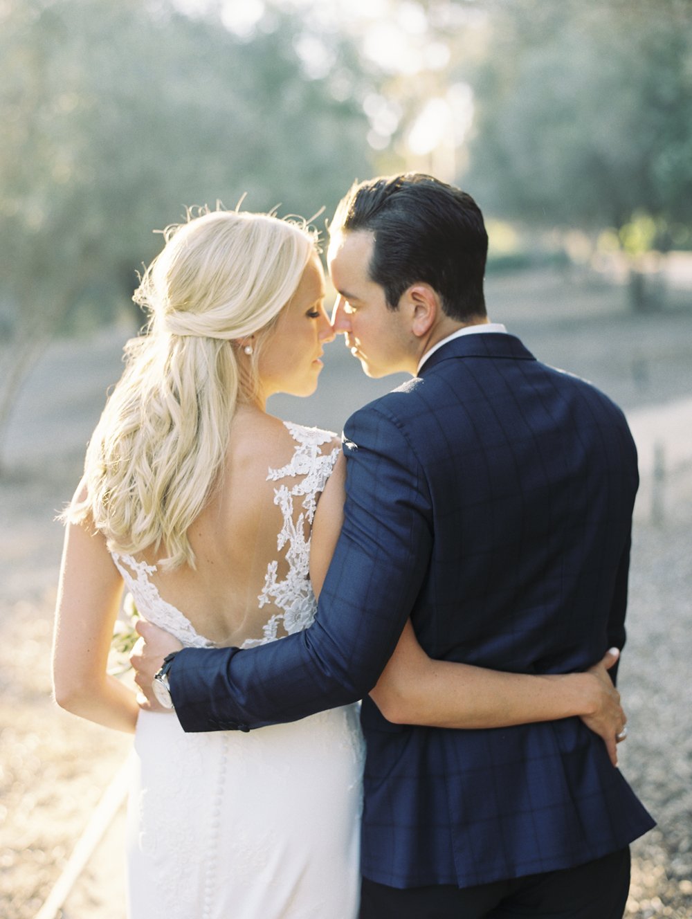 Couple with Arms Around Each Other