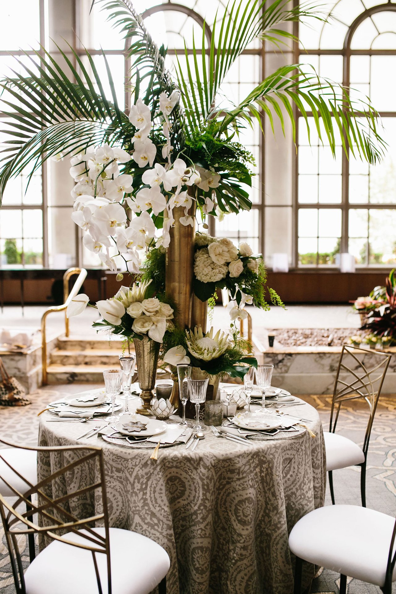 Tropical Tablescape with Tall Gold Décor