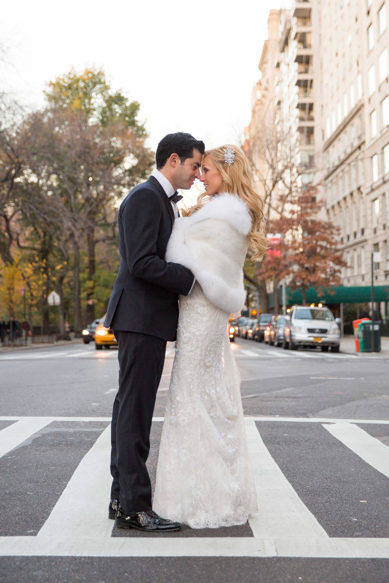 Bride and Groom Embrace on NYC Street