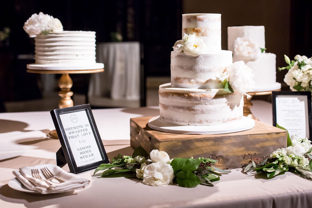 Three Wedding Cakes on Table