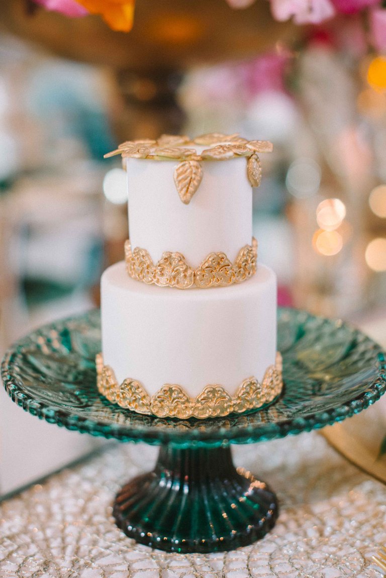 Two-Tier White Cake with Gold Accents