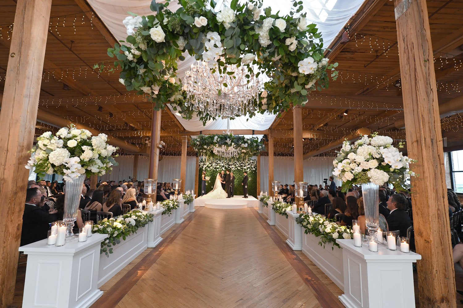Bride & Groom at End of Wood Aisle