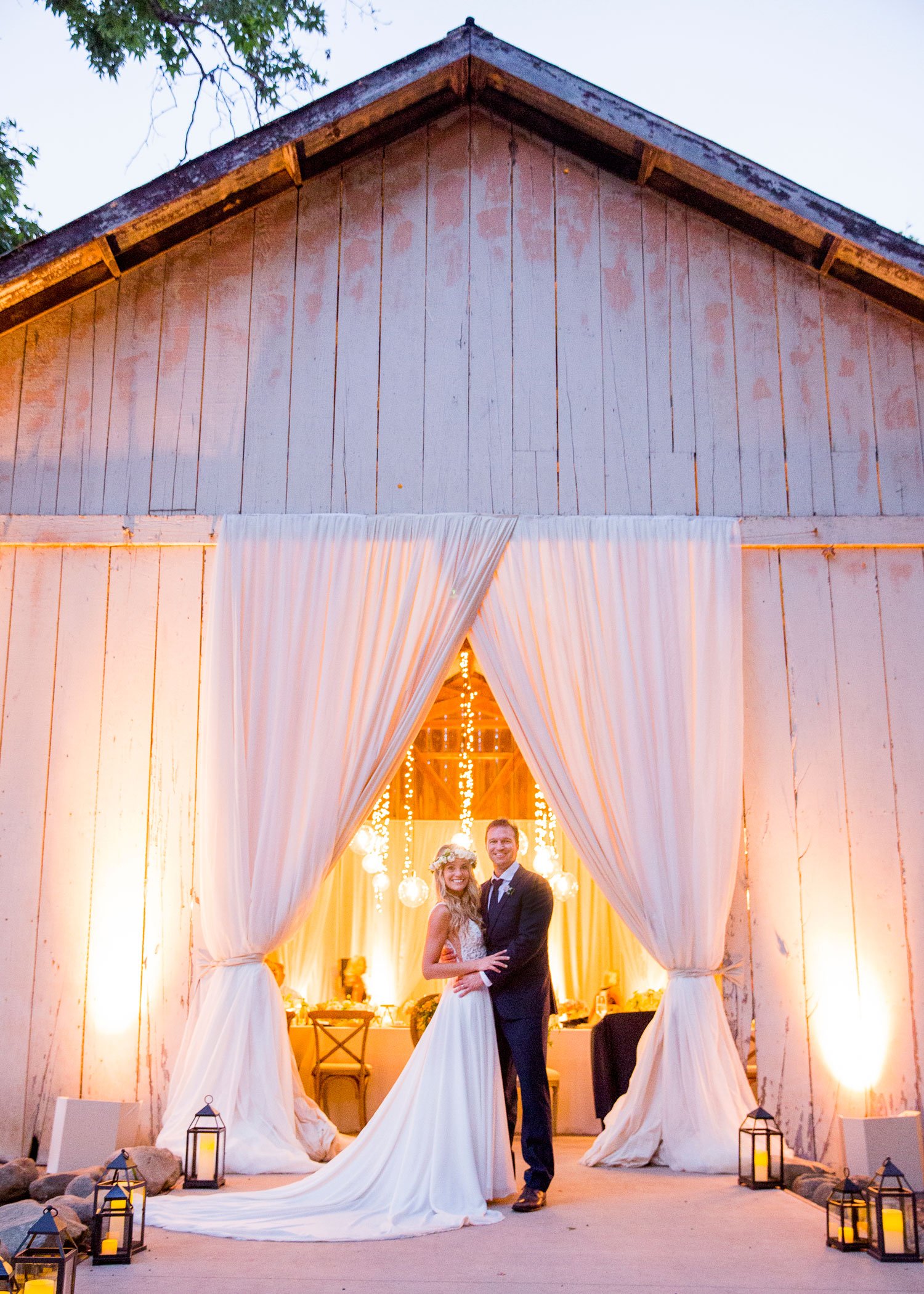 Bride & Groom Outside of Barn Venue