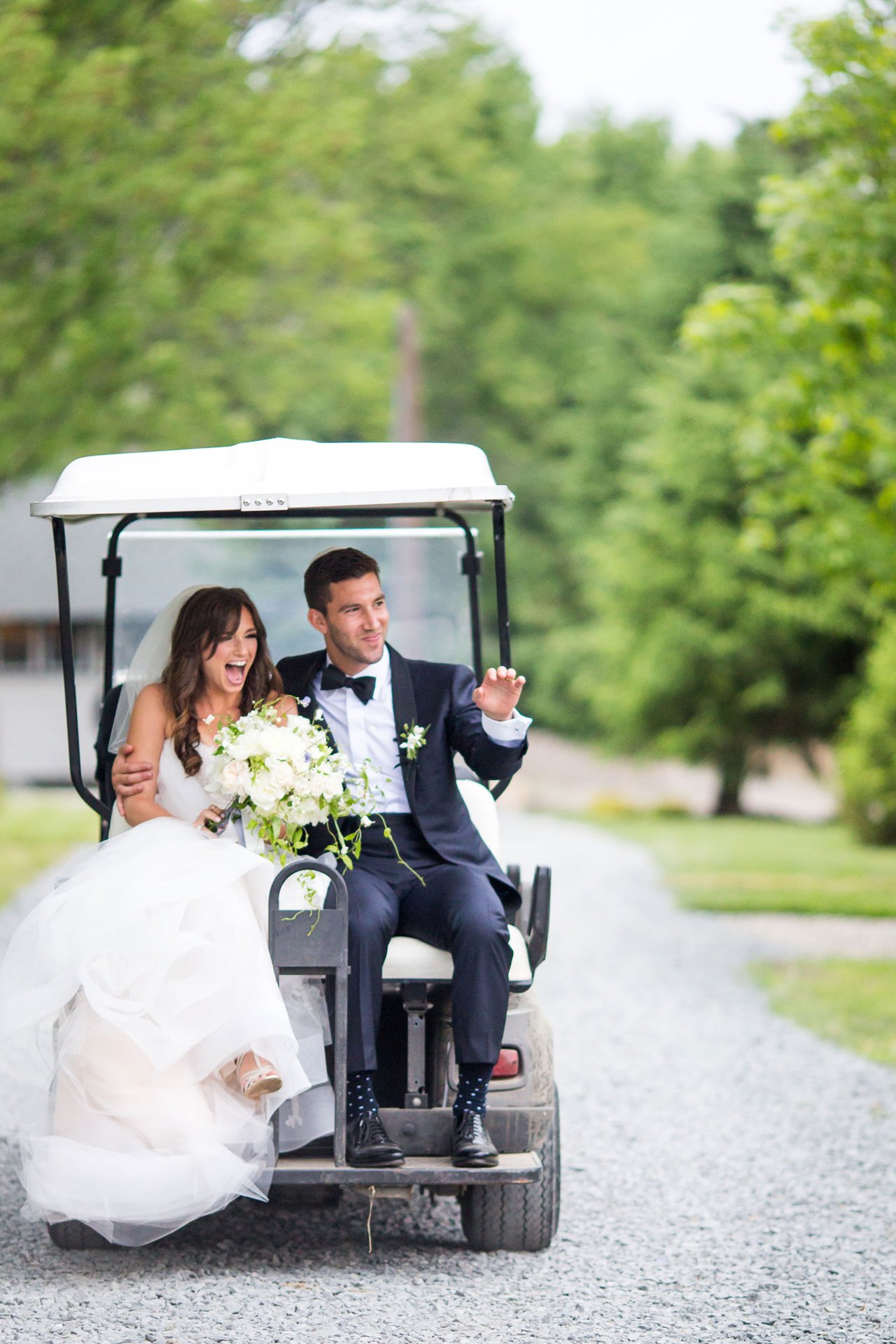 Bride & Groom on Golf Cart After Ceremony