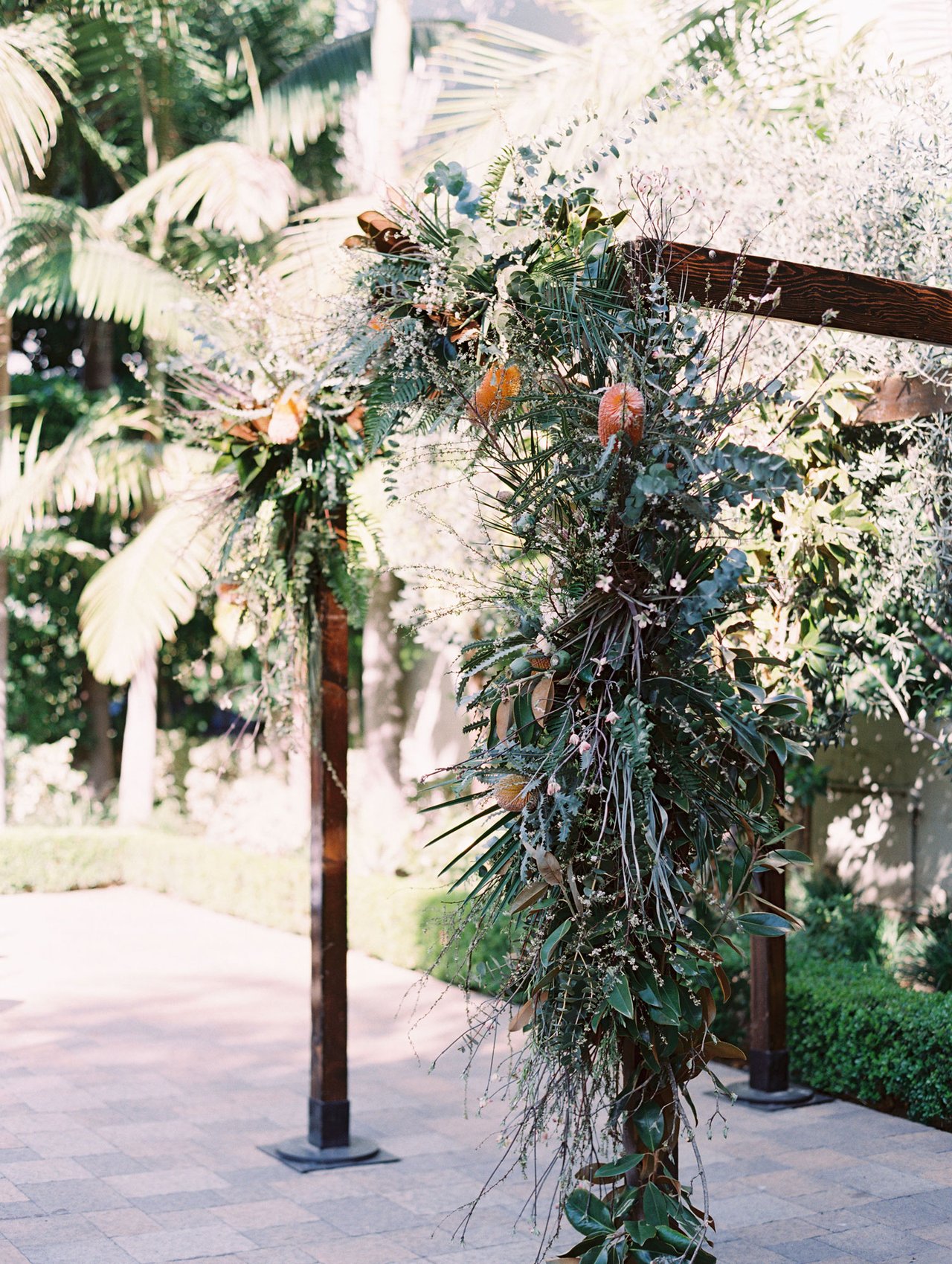 Four-Post Wedding Structure with Greenery