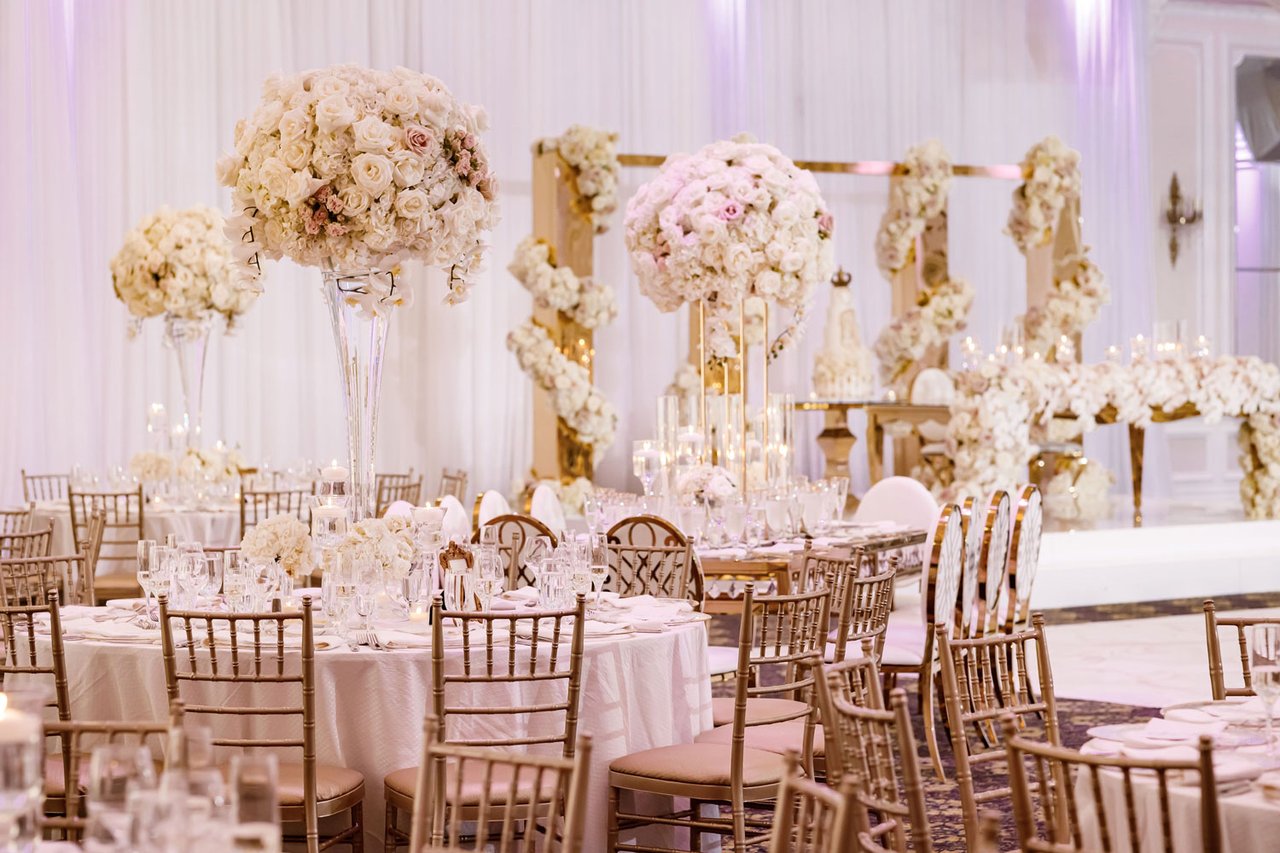 Gold Seating & Tall Ivory Centerpieces