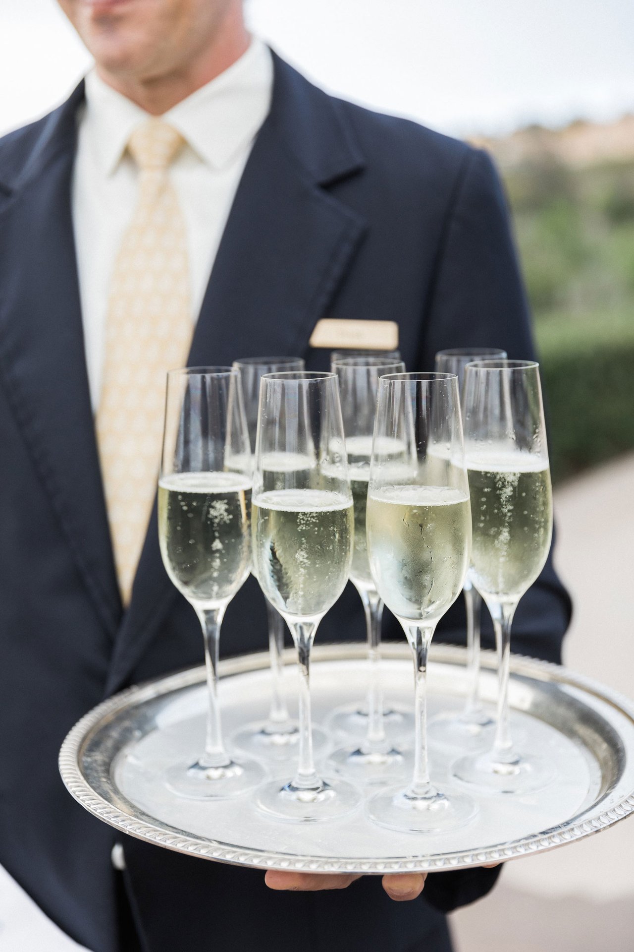 Champagne in Flutes on Round Tray