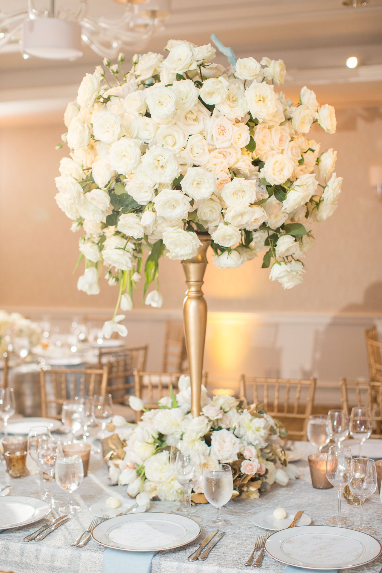 Tall Ivory Centerpiece on Gold Riser