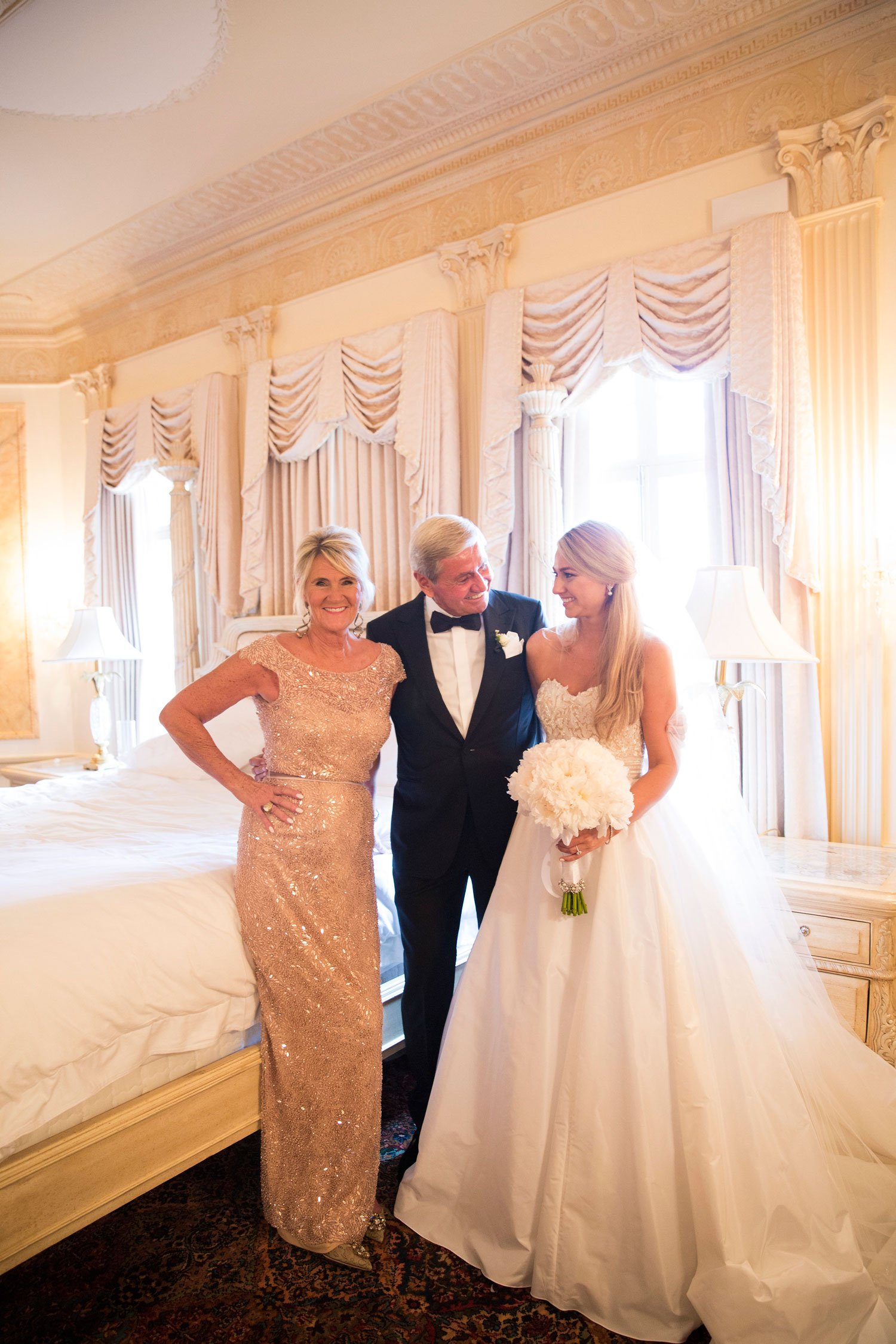 Mother & Father in Bridal Suite with Bride