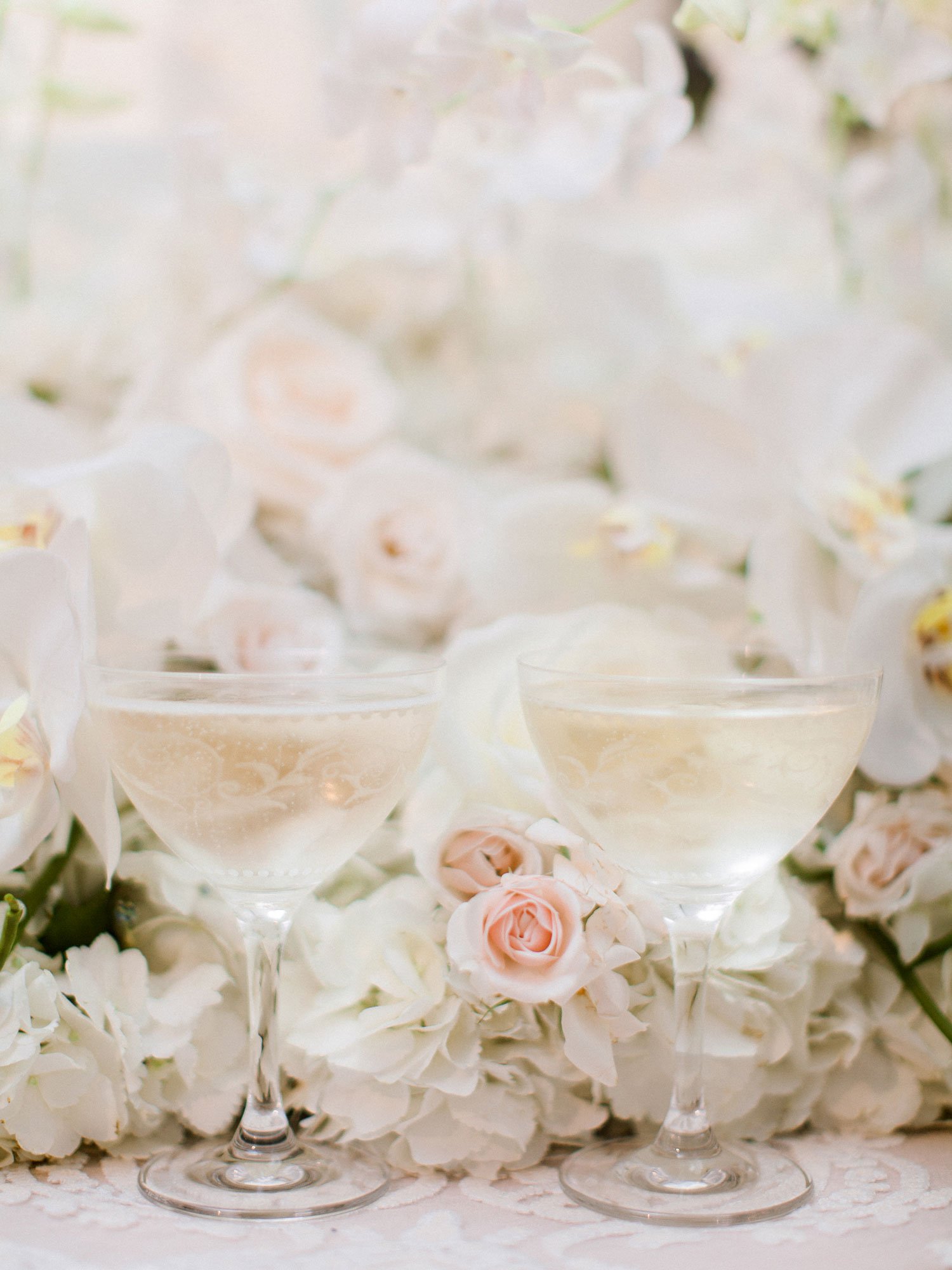 Champagne in Coupe Glasses at Table