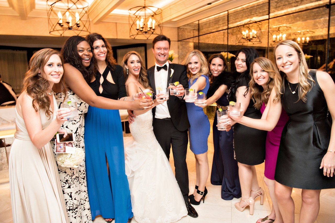 Newlyweds with Friends at Reception