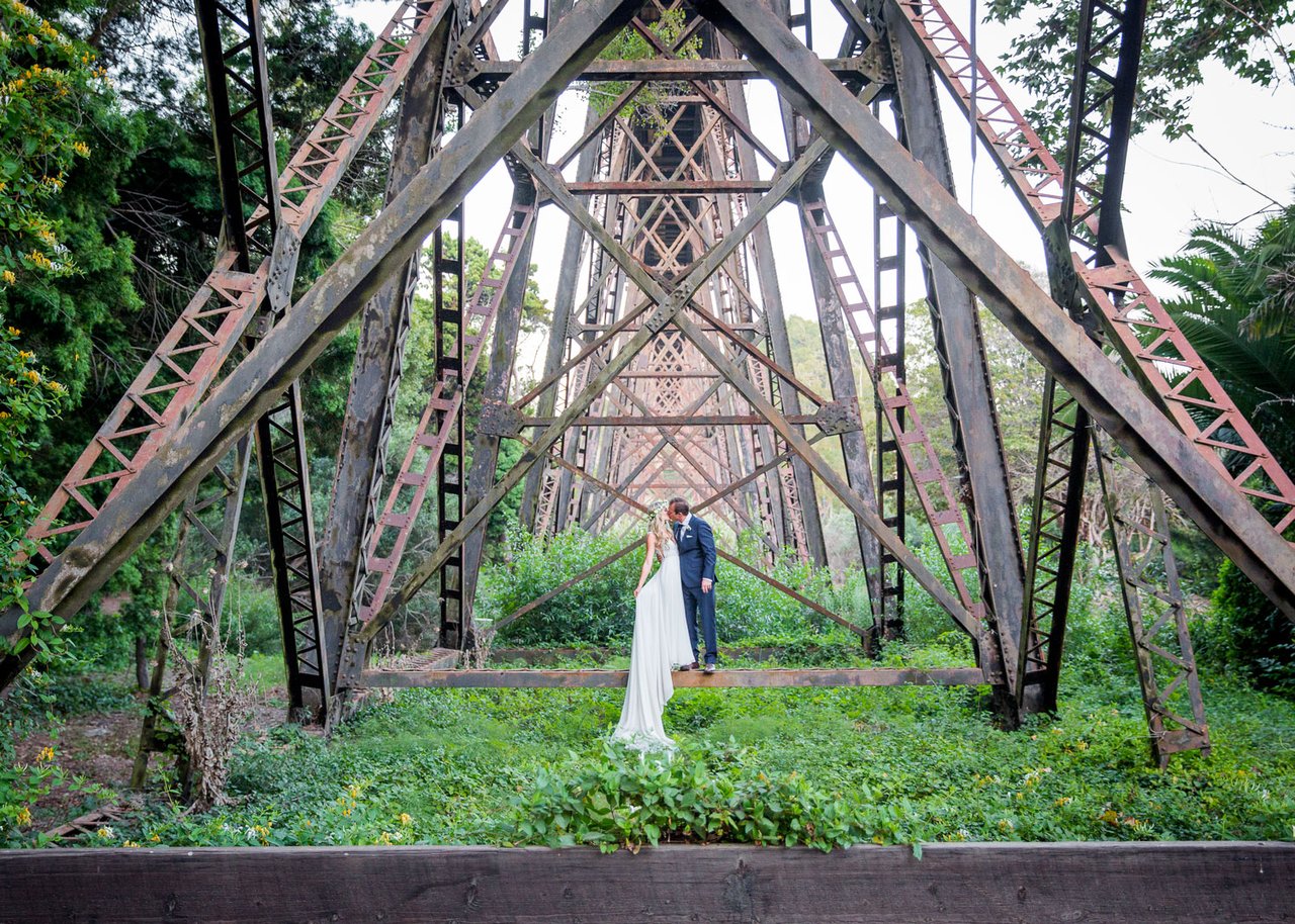 Rustic Wedding Portrait Under Bridge