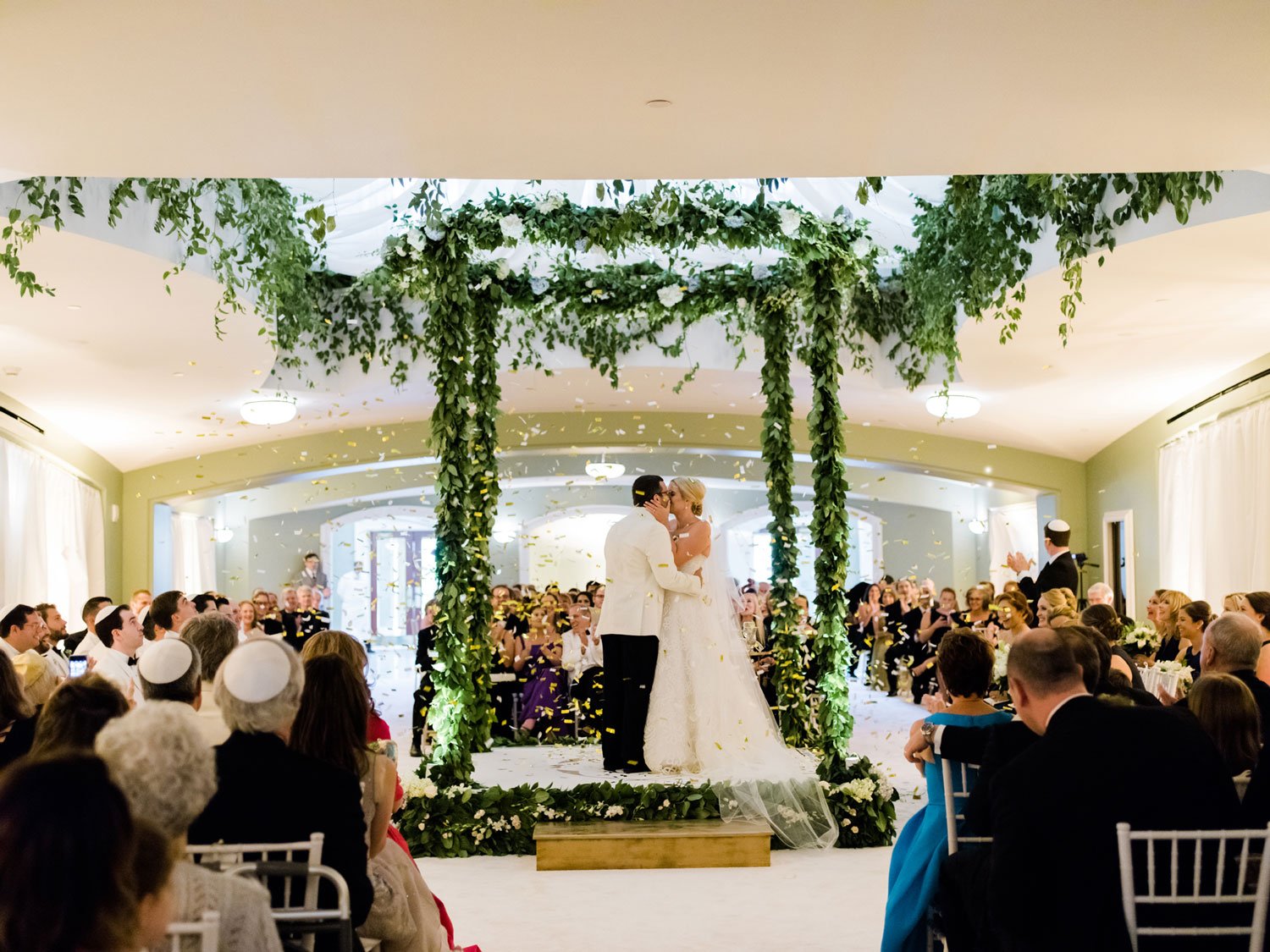 Gold Confetti at Indoor Wedding Ceremony