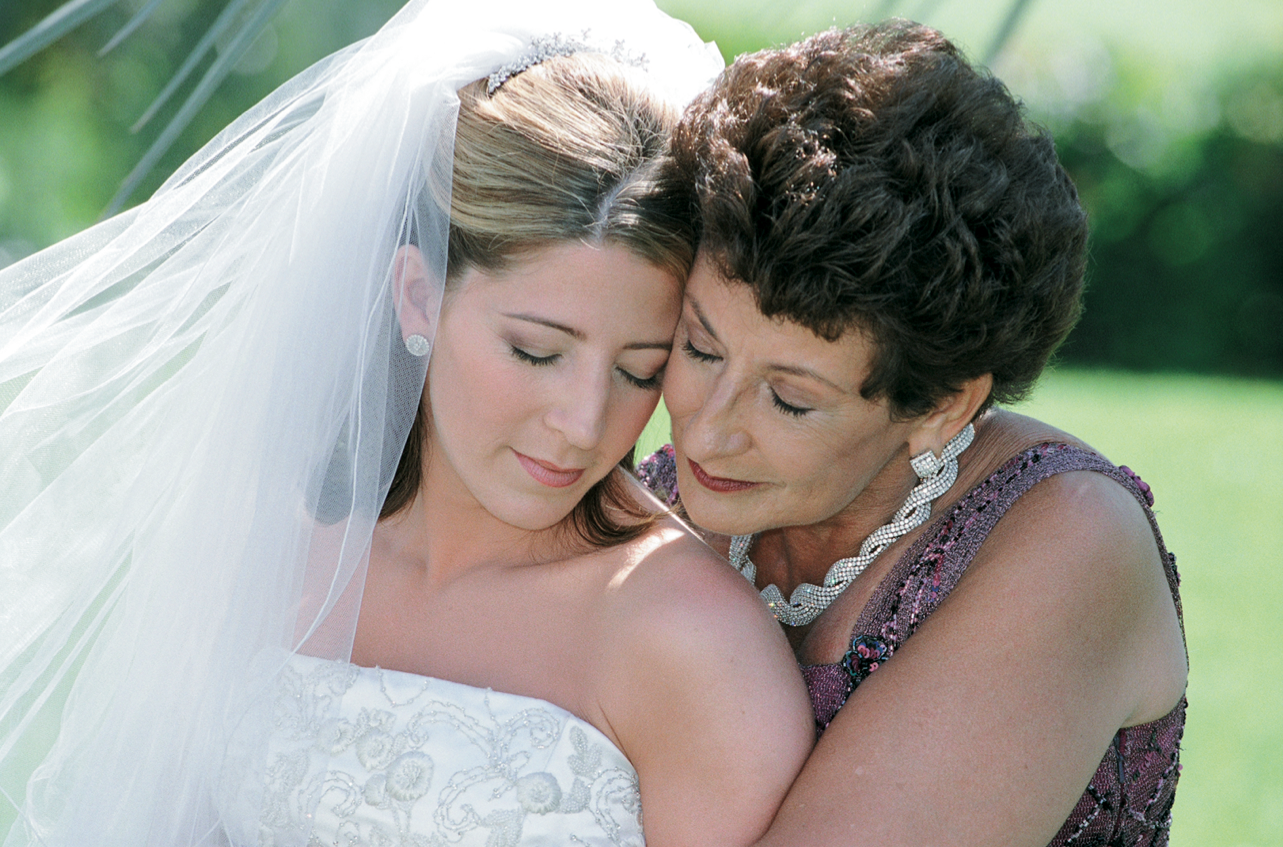 Mothers Photos - Bride in Veil and Her Mother - Inside Weddings