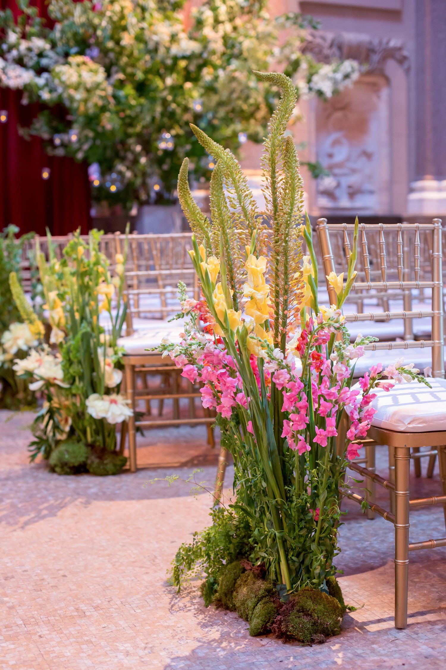 Colorful Flowers Next to Chairs