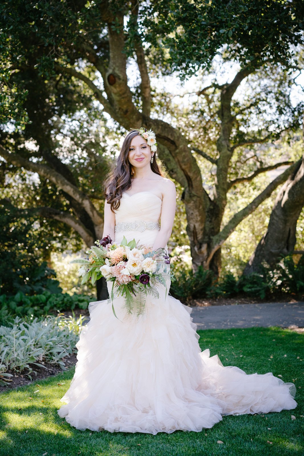 Bride with Ruffled Gown and Natural Headpiece