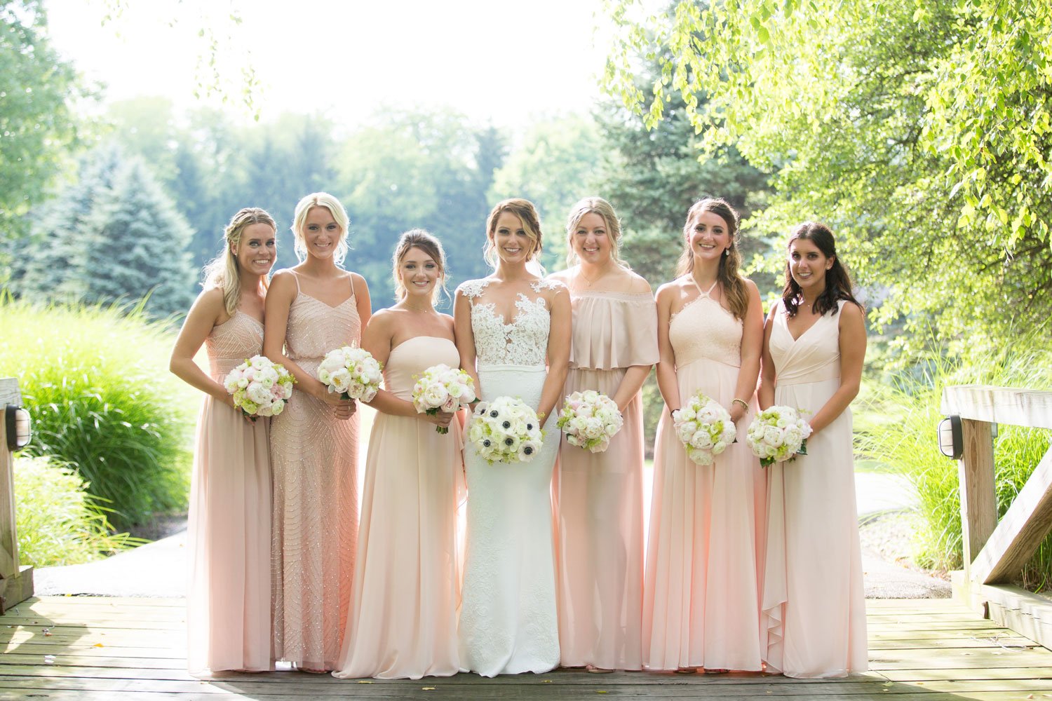 Bride and Bridesmaids on the Bridge