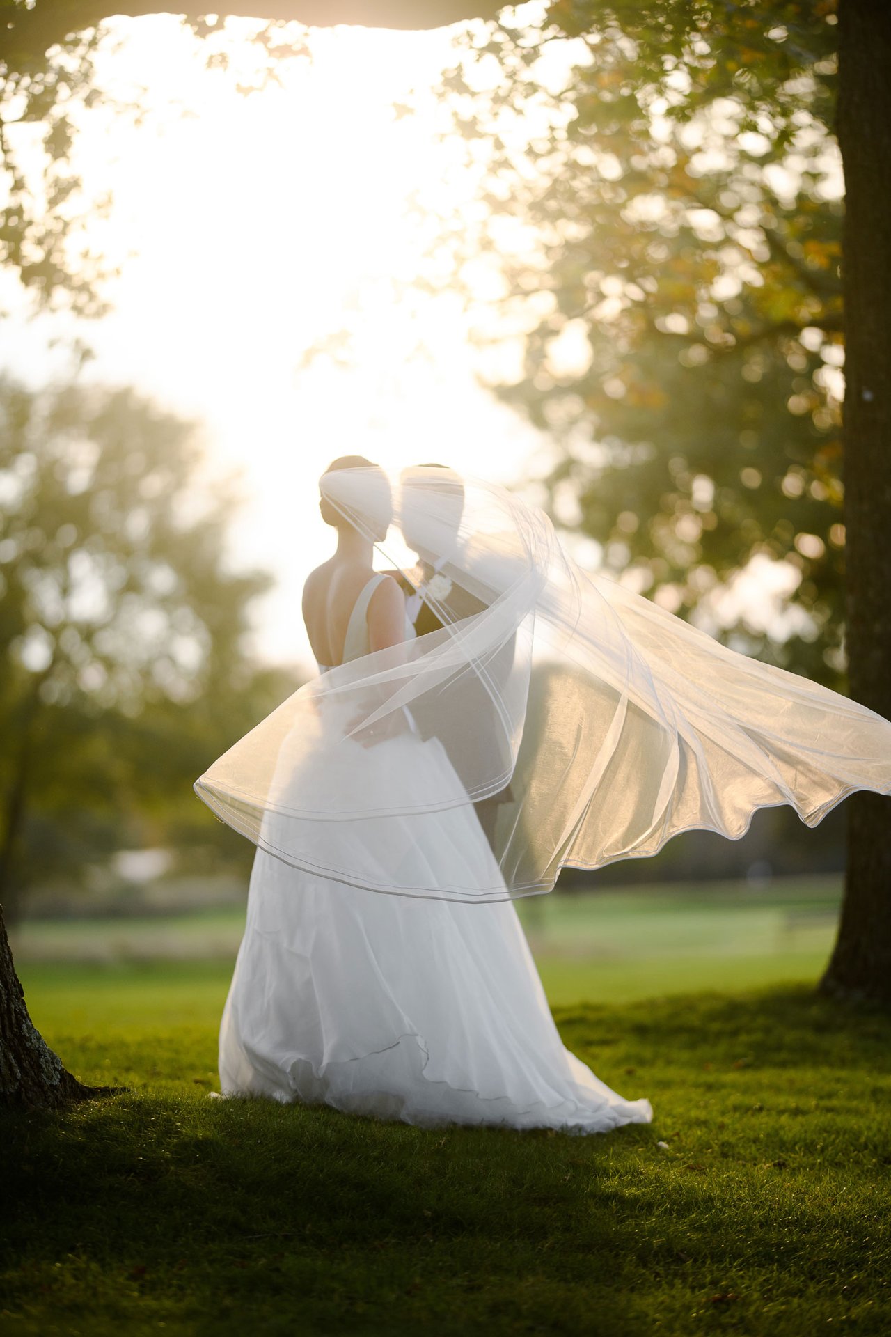 Couple's Portrait with Windswept Veil