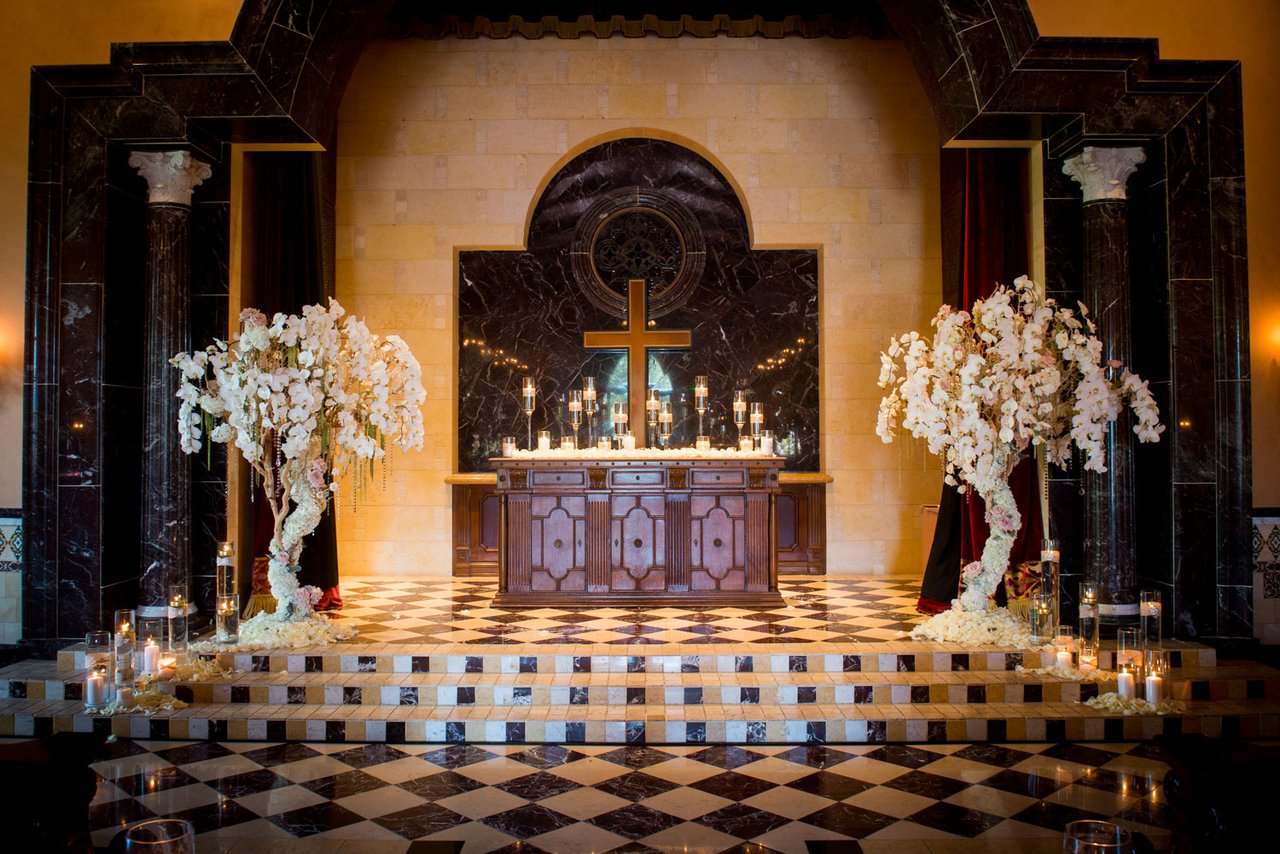 Orchid-Wrapped Trees Frame Altar