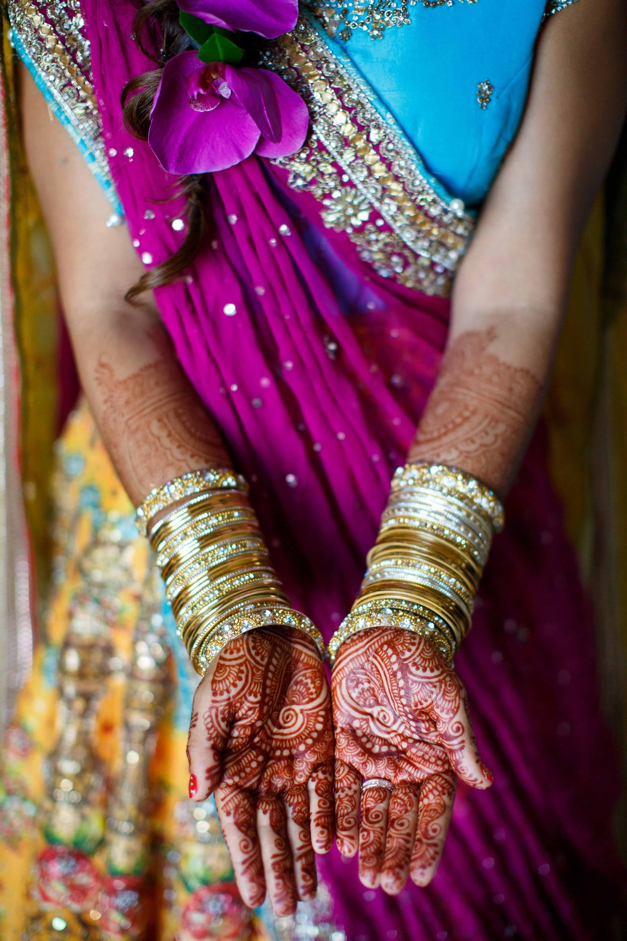 Bride in Colorful Dress with Henna and Bangles