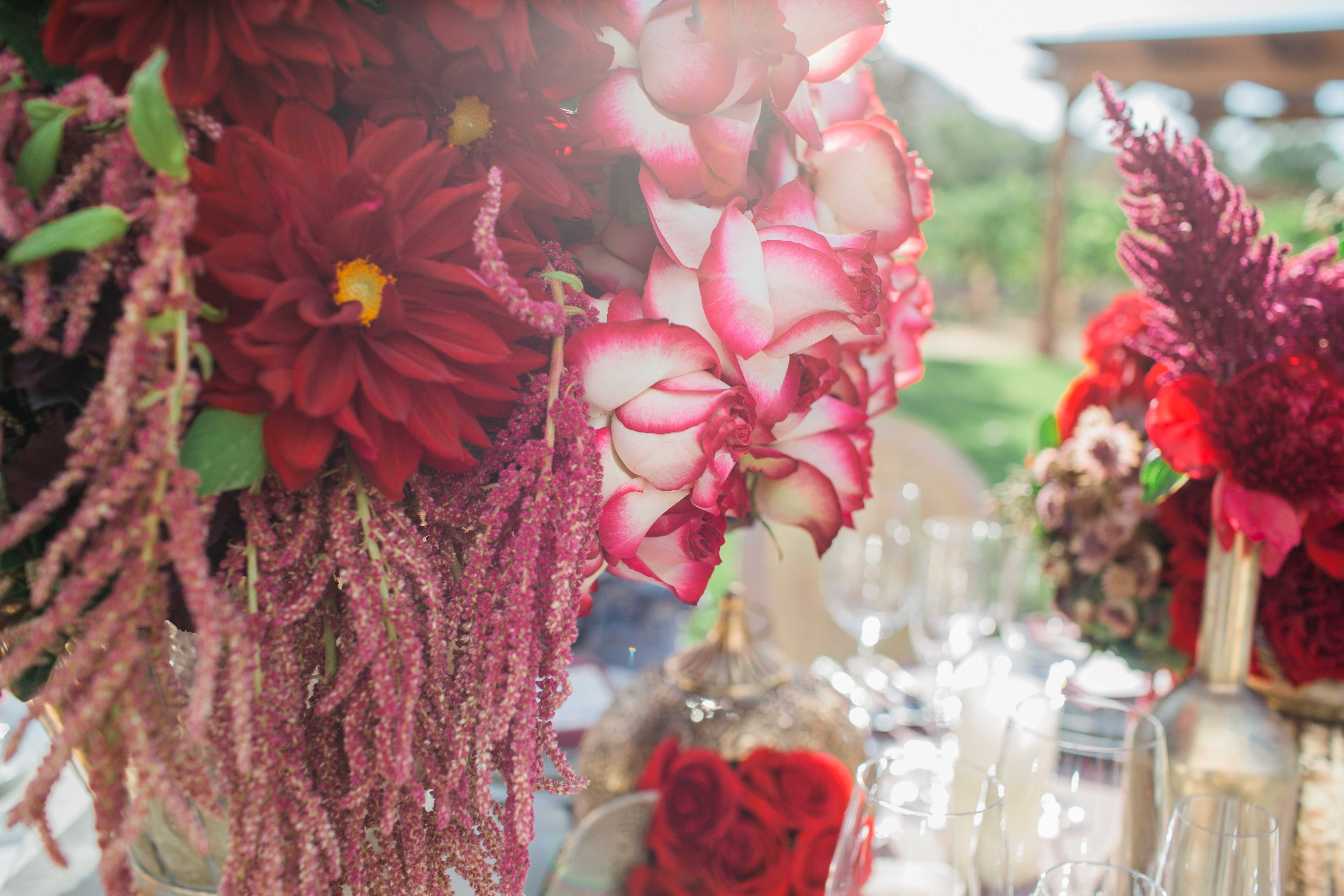 Full Red Floral Arrangements in Vases