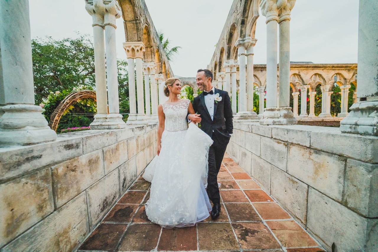 Couple Walking Down Column Path