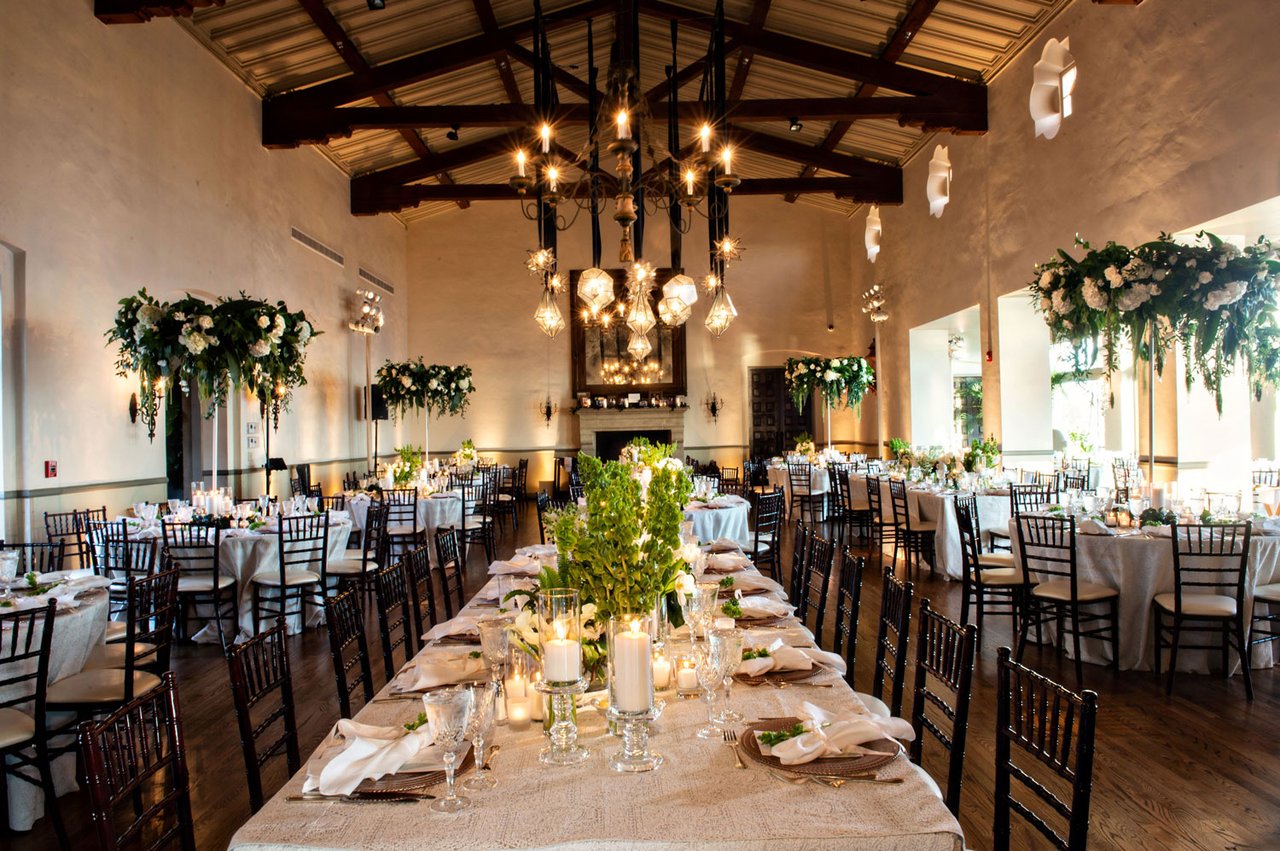 Circular Floral Centerpieces on Outer Tables