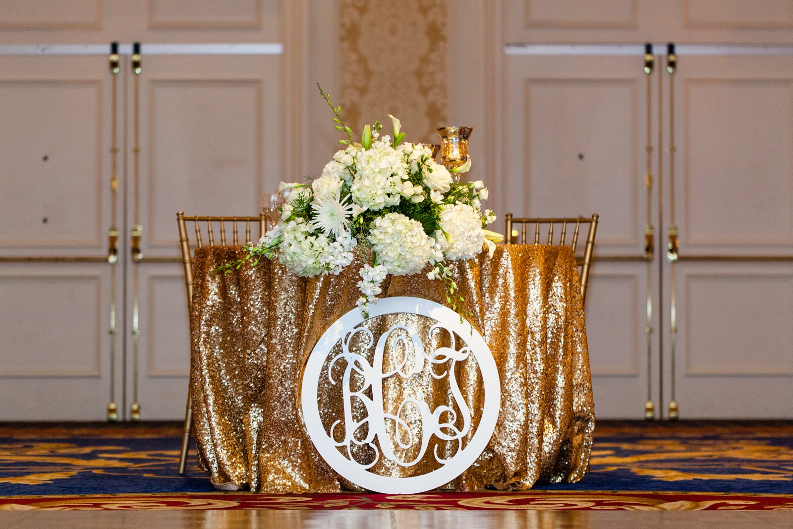 Reception Décor Photos - Gold Glitter Sweetheart Table - Inside Weddings