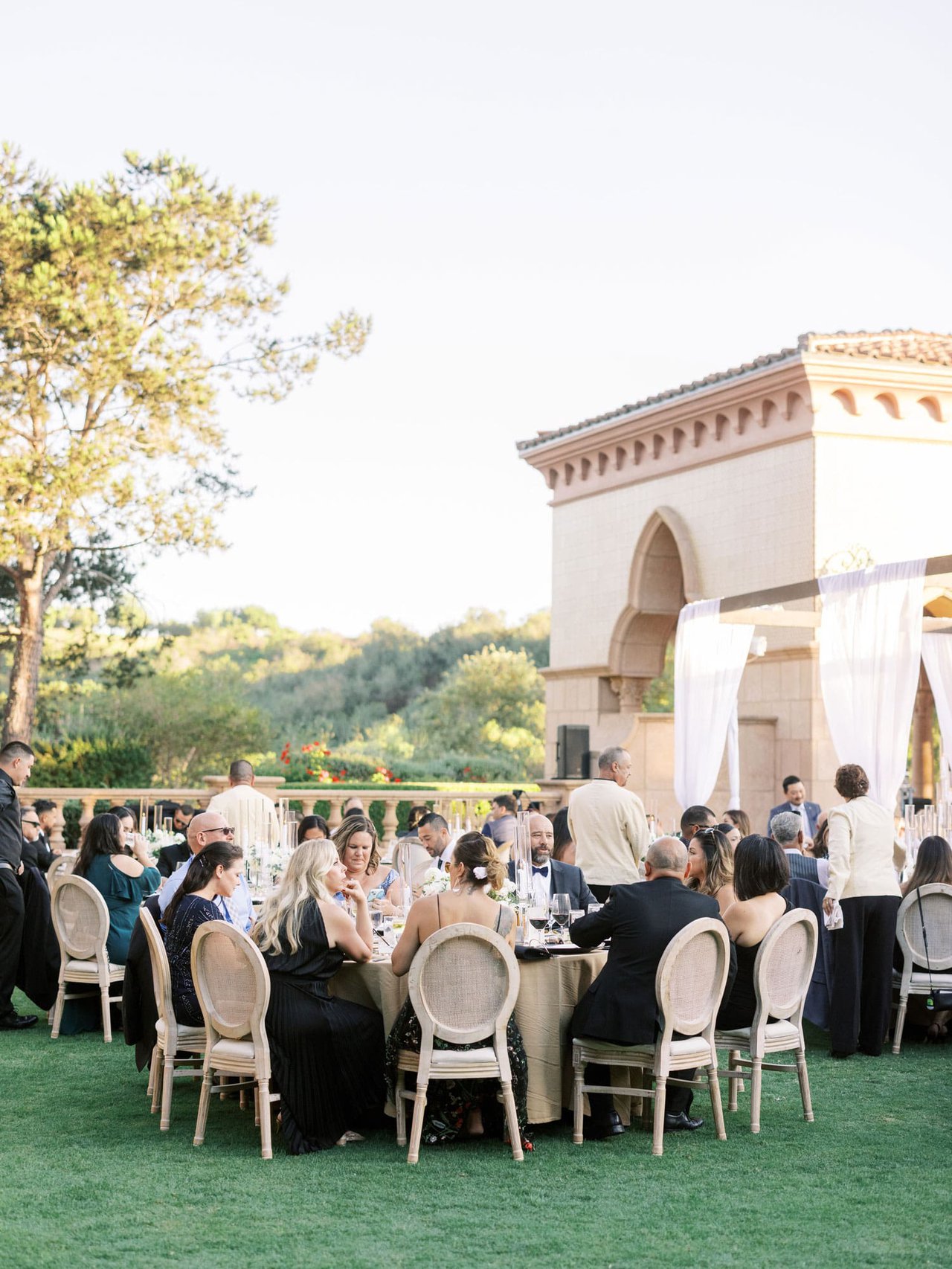 Guests Seated at Outdoor Wedding Reception