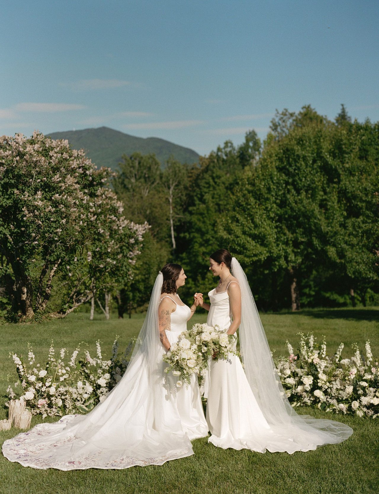 Two Brides in Gowns at Wedding Ceremony