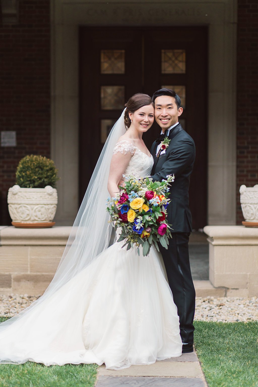 Couple's Portrait with Colorful Bouquet