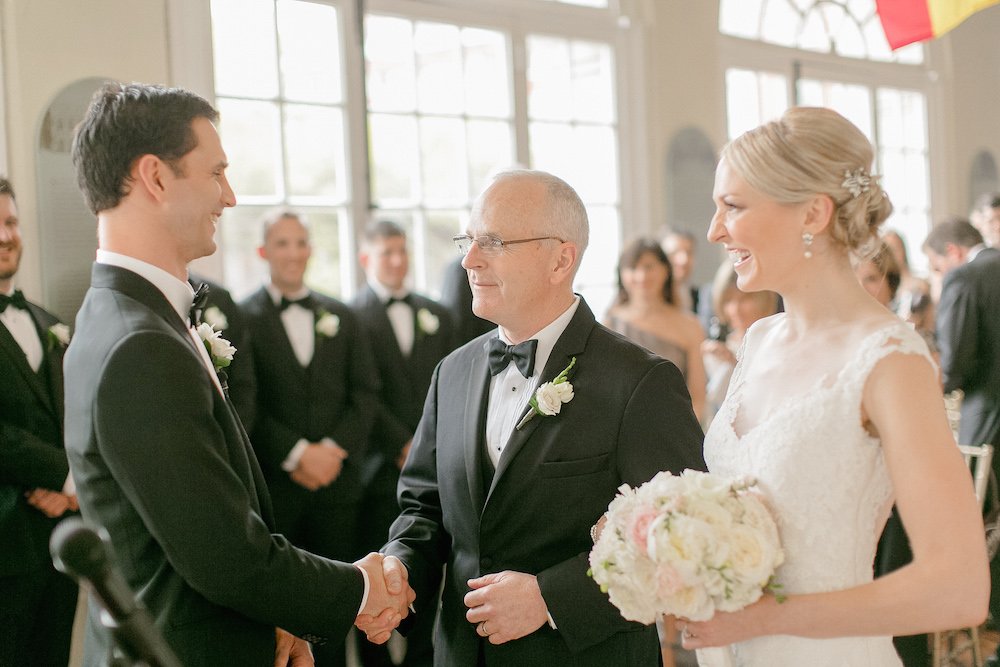 Father of the Bride & Groom Shake Hands at Altar