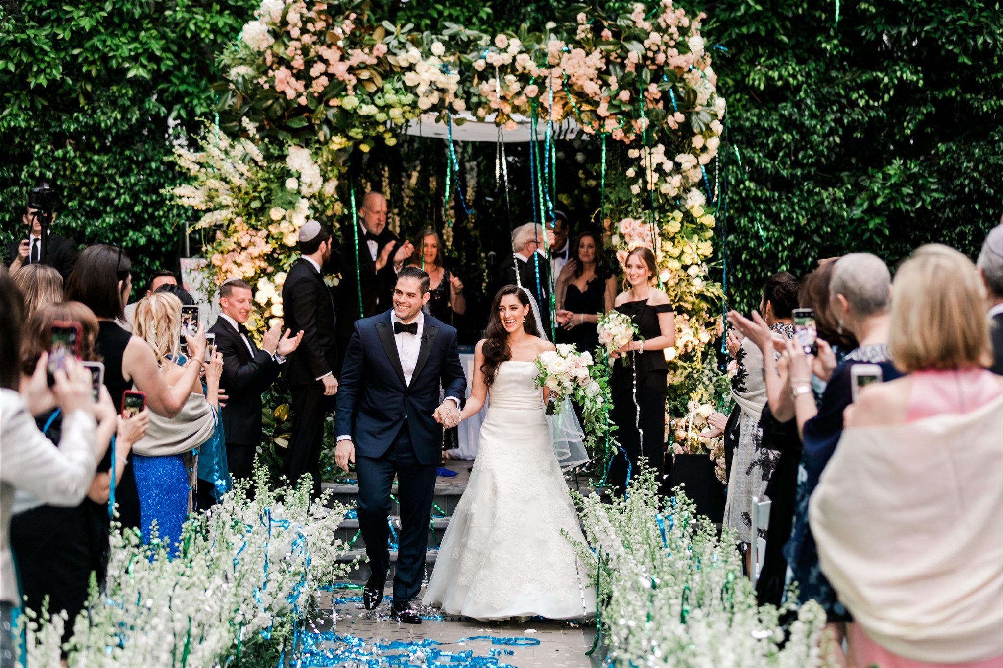 Couple's Recessional After Confetti Cannon