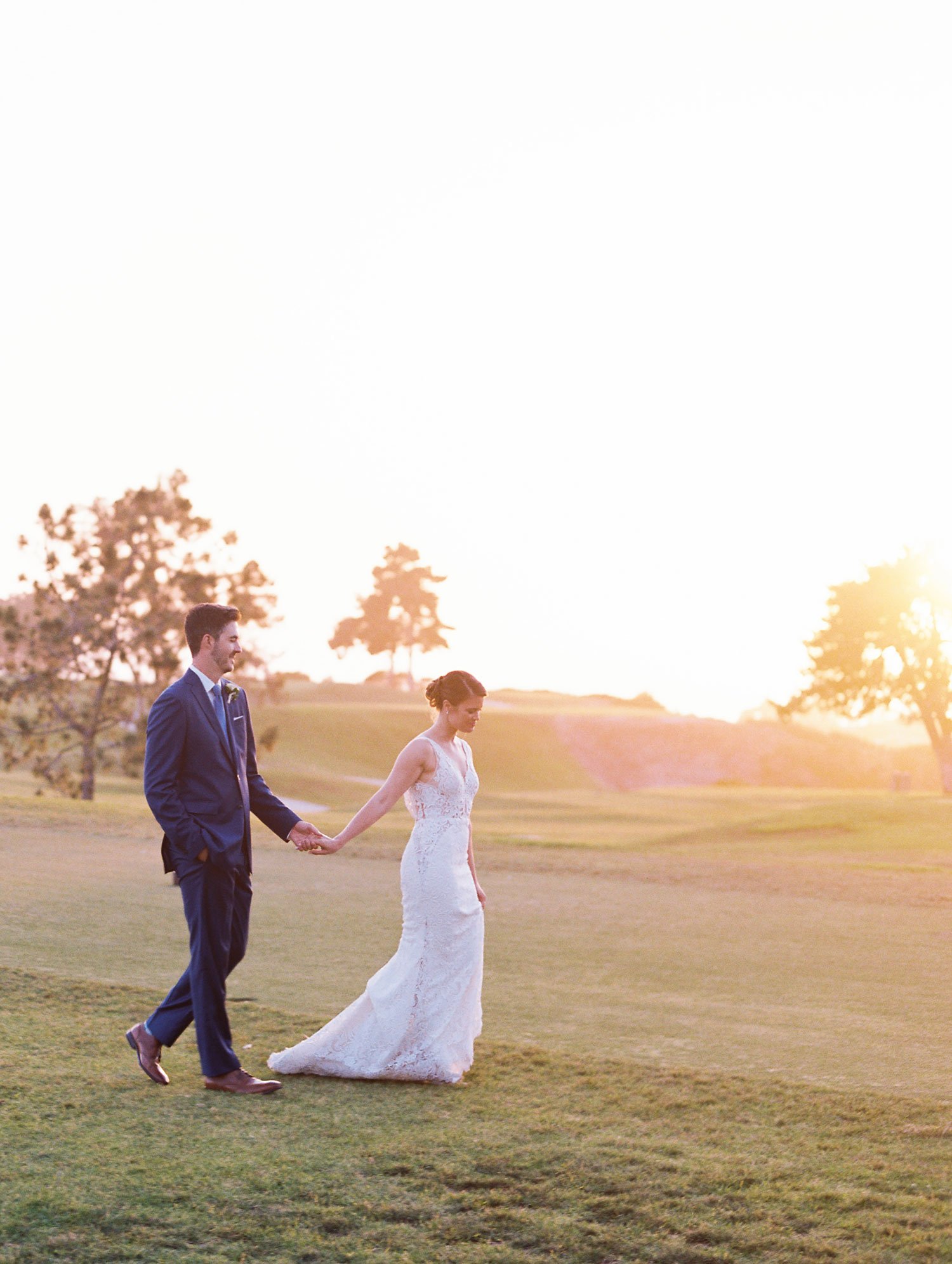 Bride & Groom on Golf Course at Sunset
