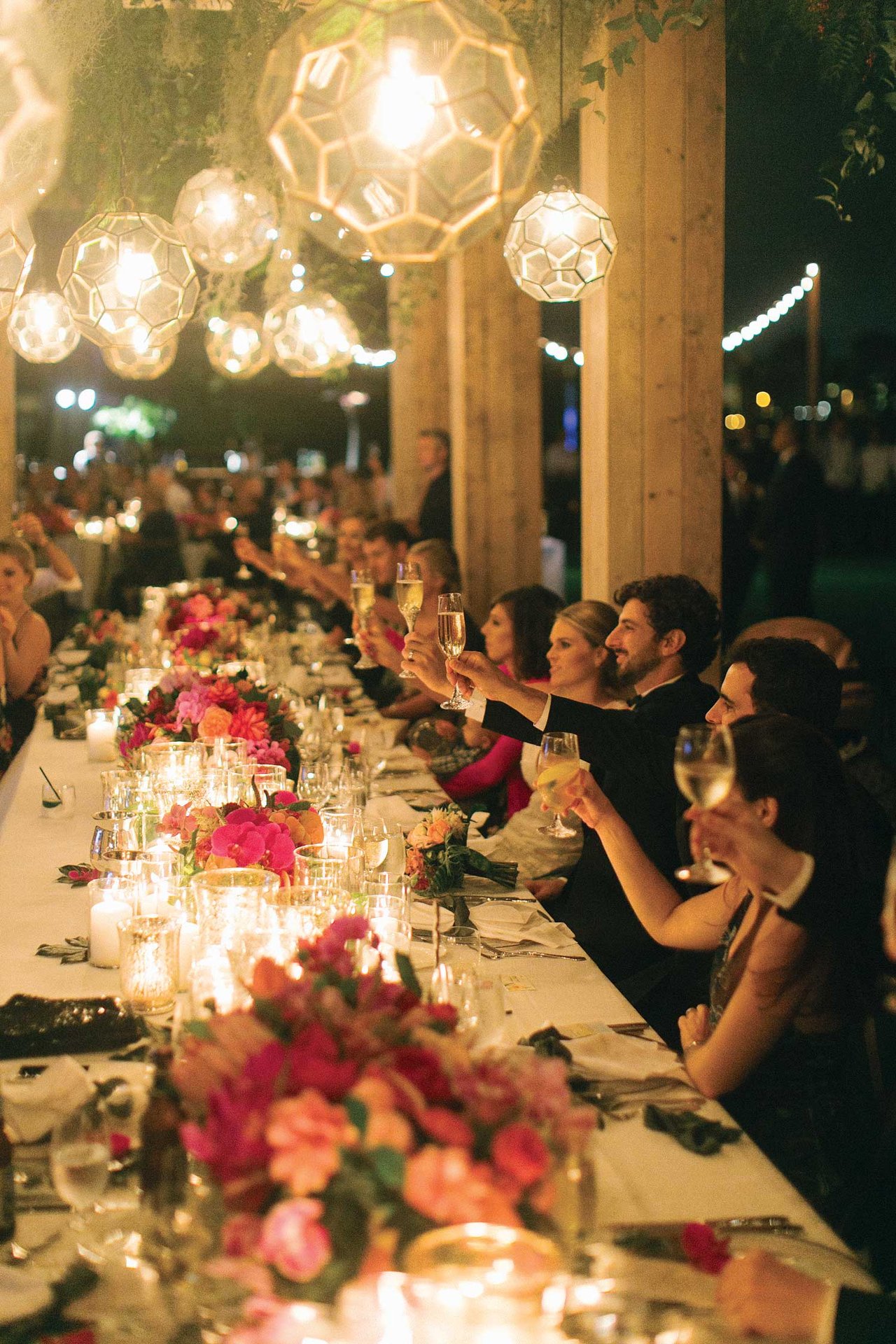 Guests Toasting at Head Table