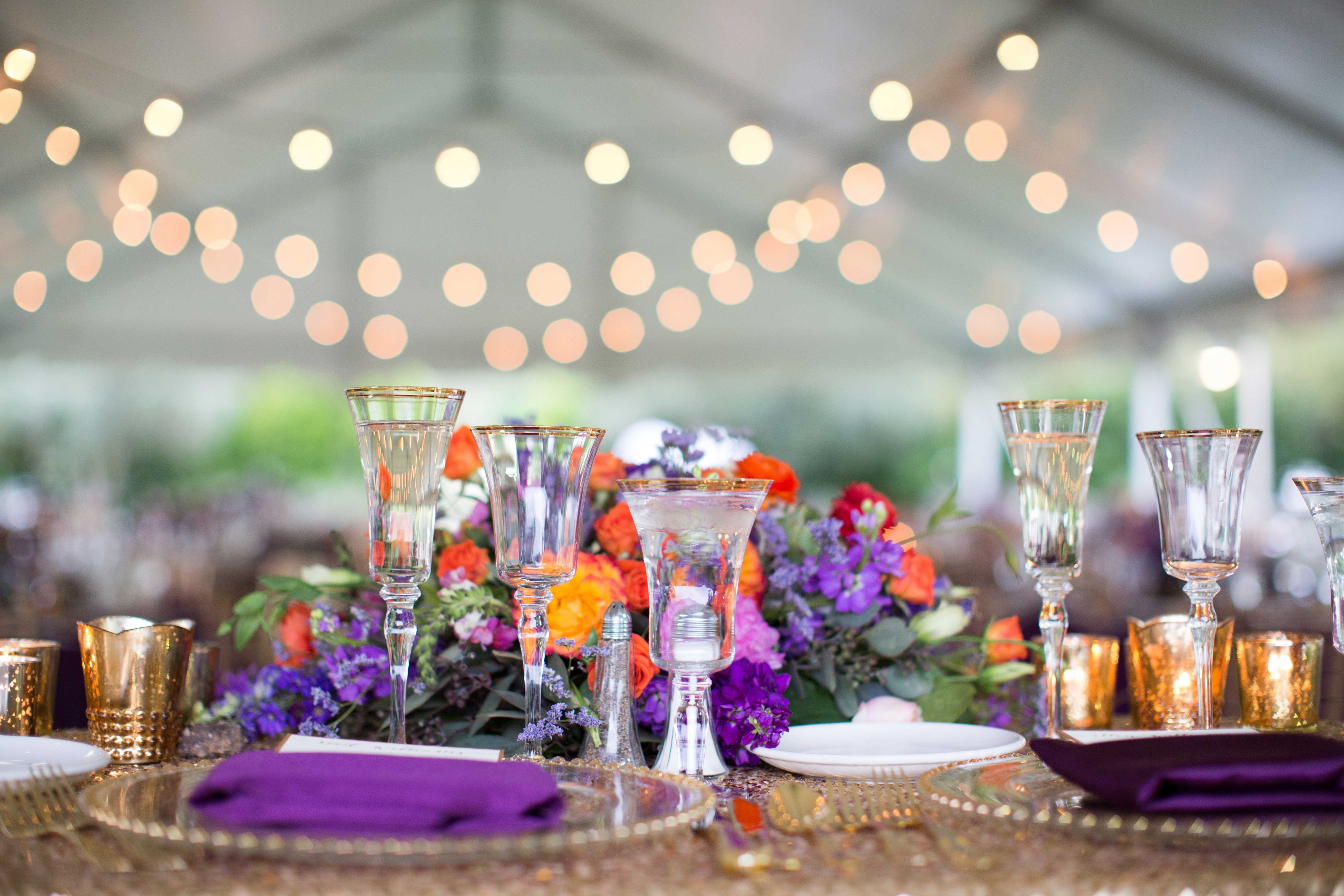 Gold Table Linens with Purple Accents and Colorful Florals