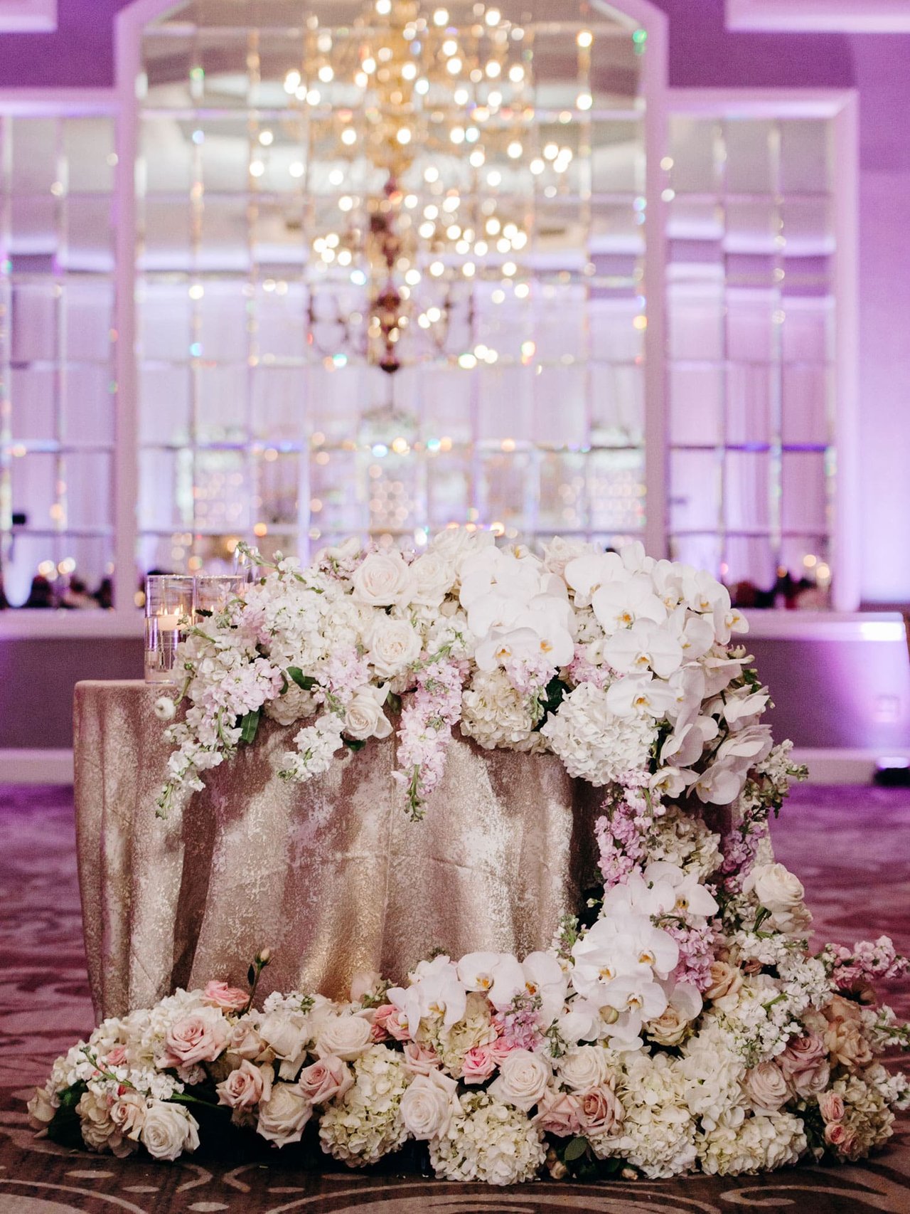 Lush Florals Decorating Sweetheart Table