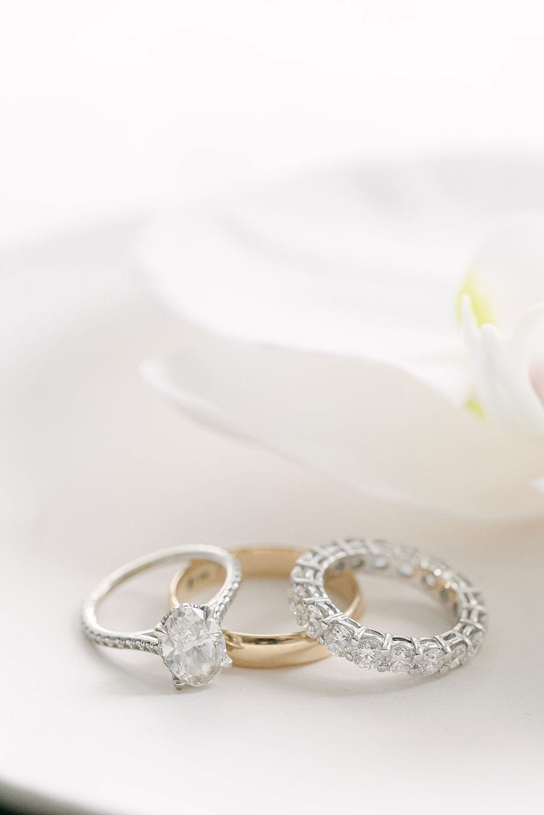 Oval-Cut Engagement Ring & Wedding Rings