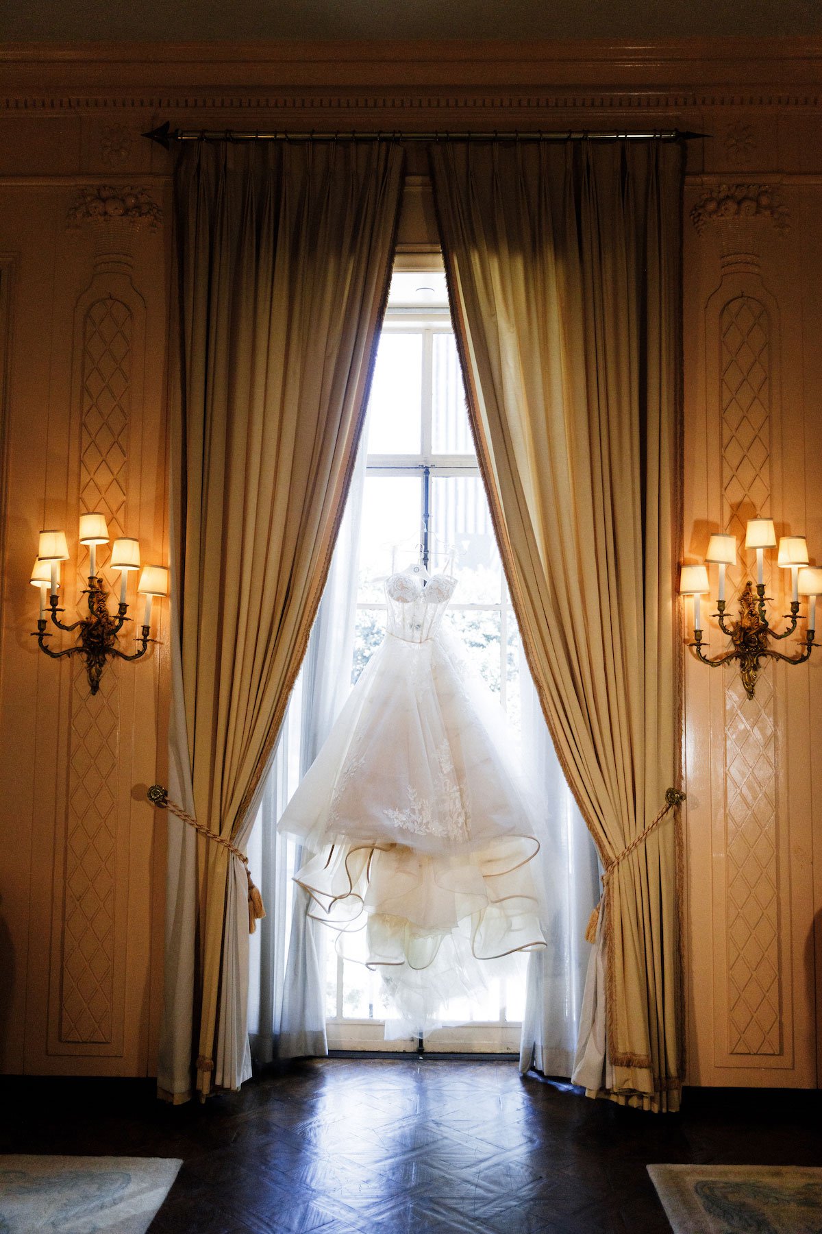 Wedding Dress Hanging in Regal Window