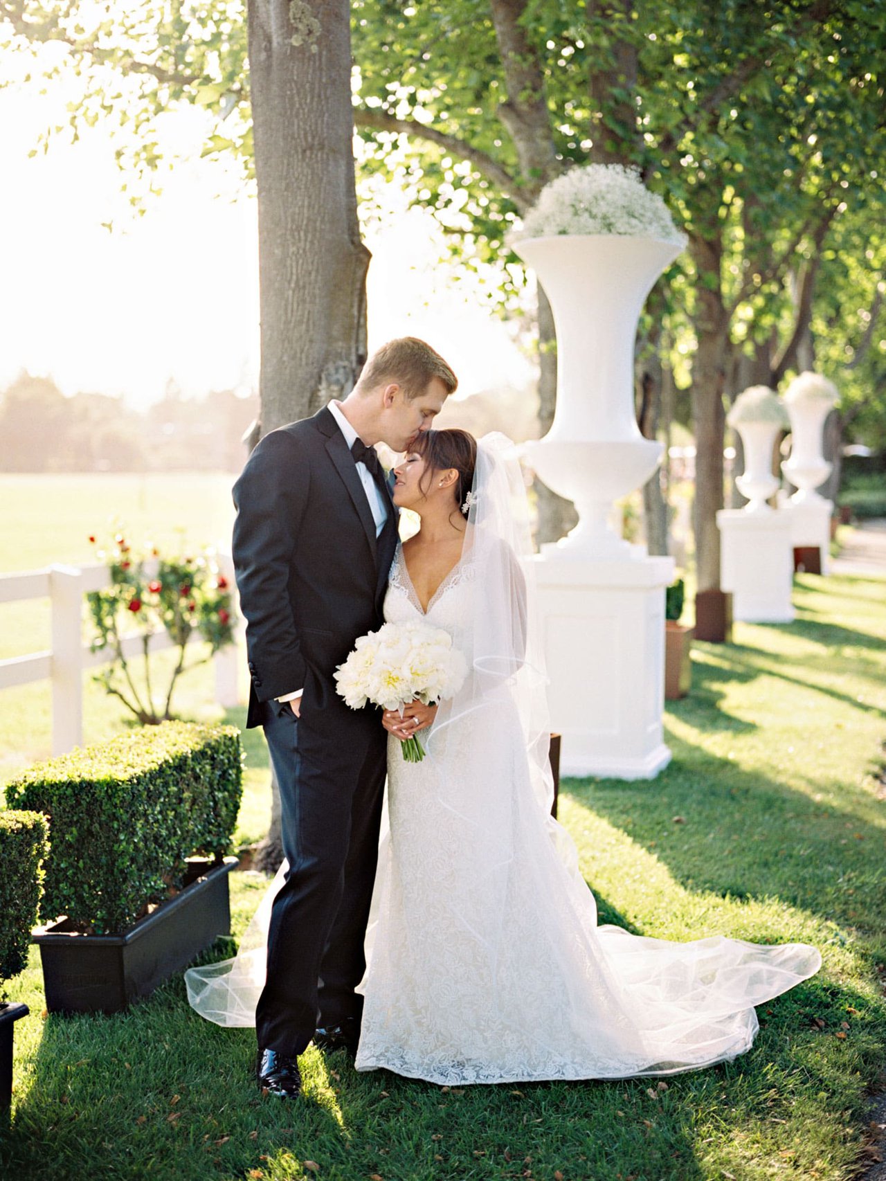 Romantic Forehead Kiss Wedding Portrait