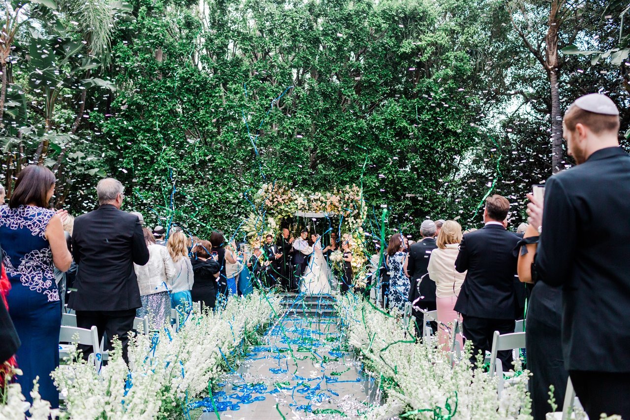 Blue Confetti After Breaking of the Glass