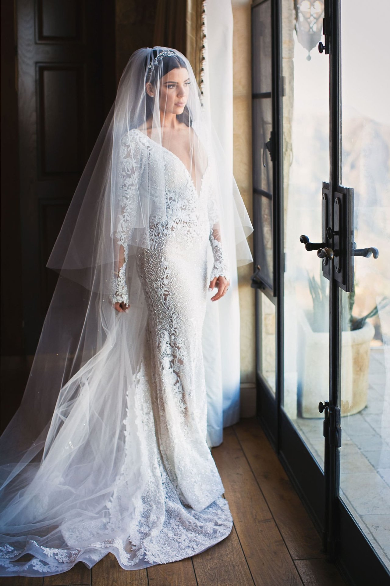 Bride in Long-Sleeve Gown with Veil