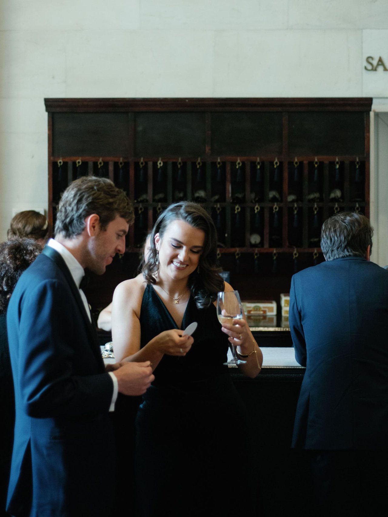 Guests Enjoying Escort Cards & Paper Goods