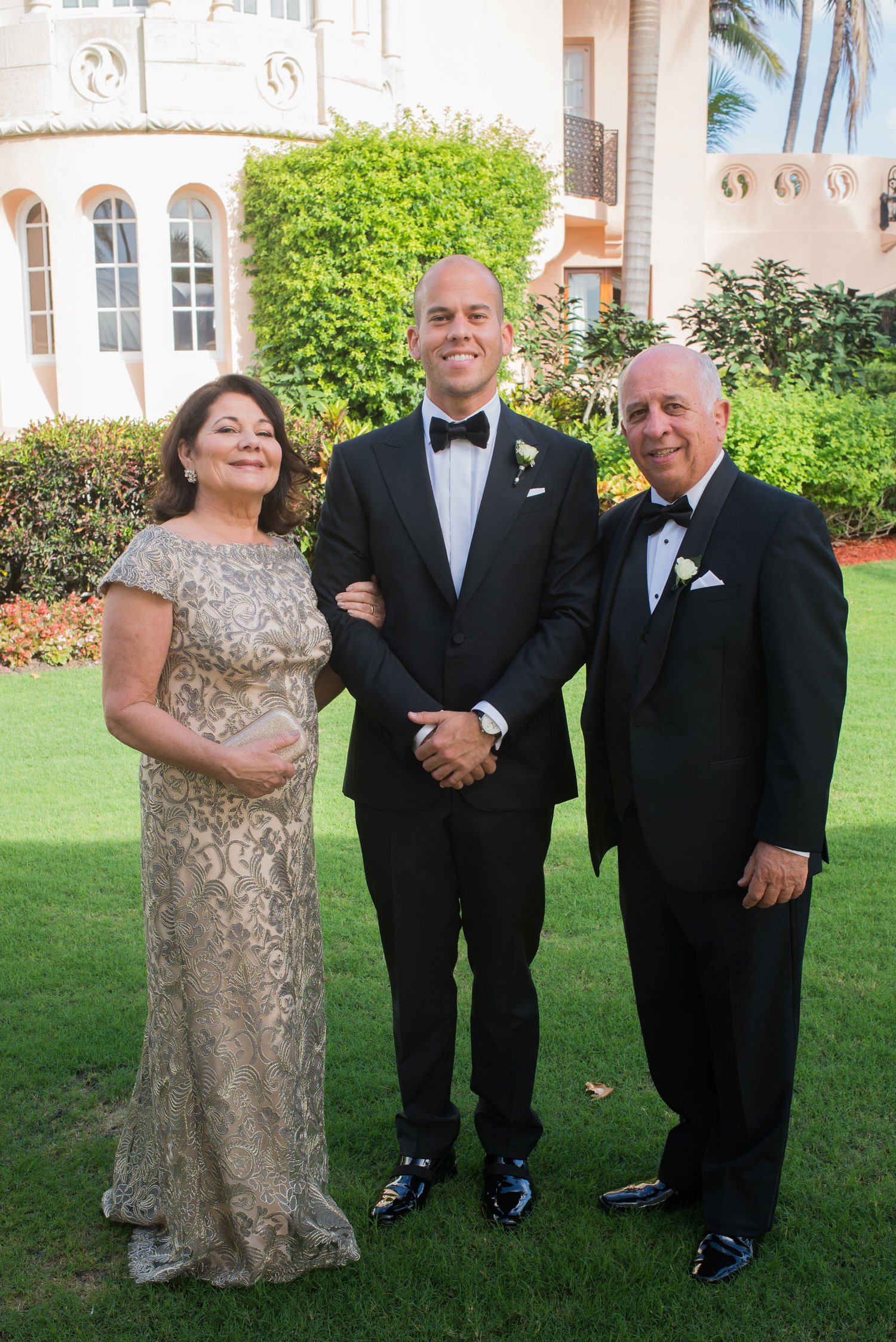 Groom with Mother & Father on Lawn