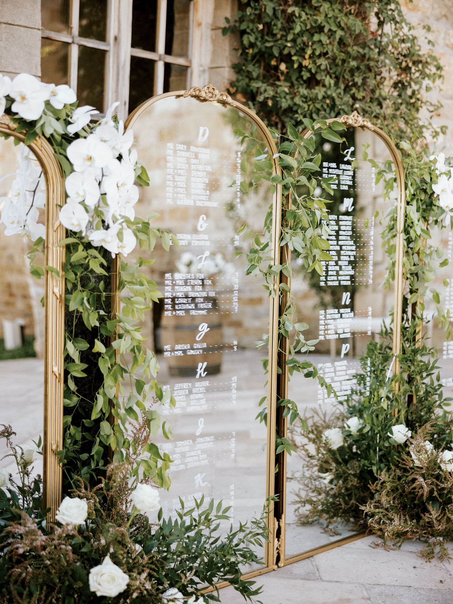 Gold Mirror Seating Chart with Greenery