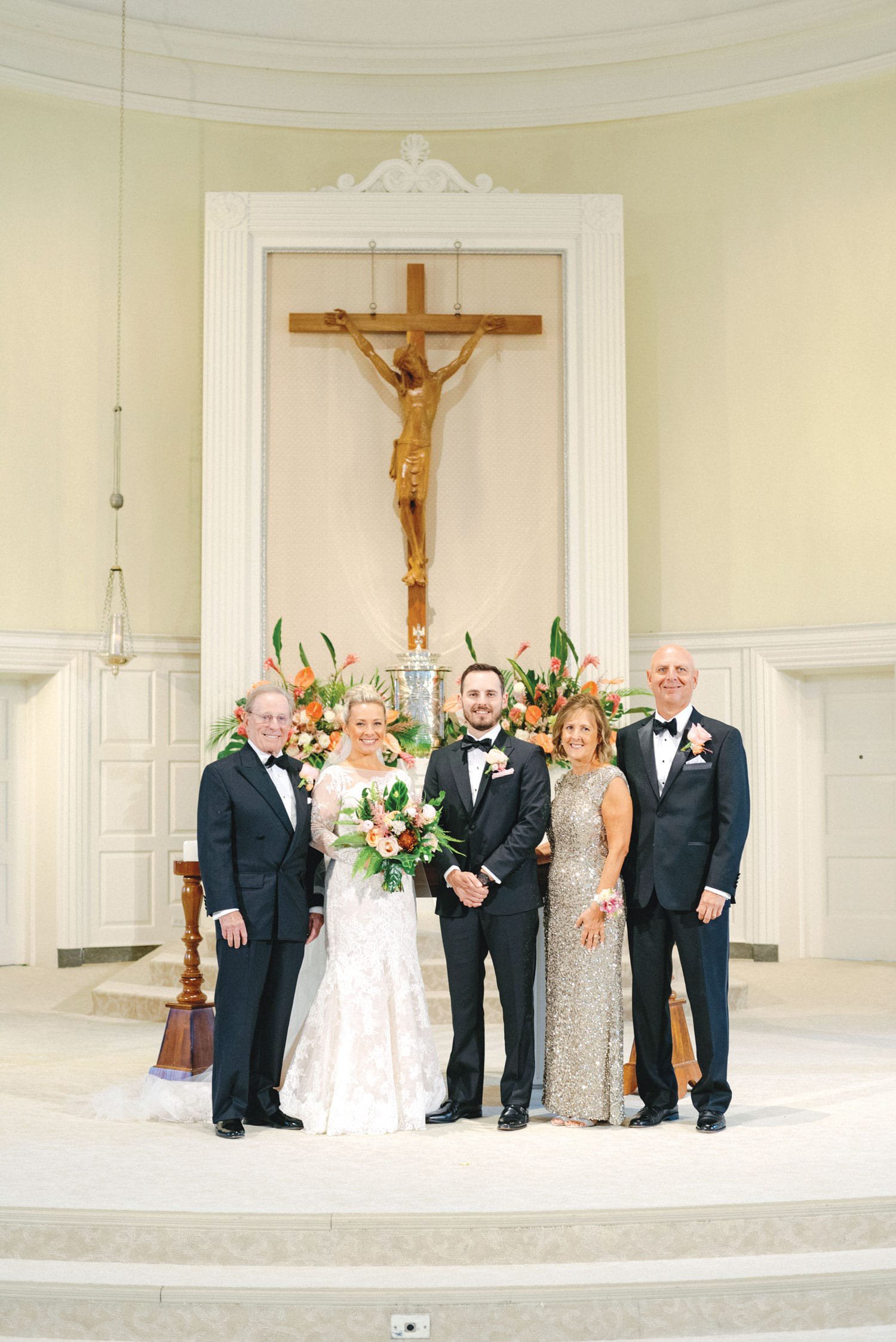 Bride & Groom with Parents at Altar
