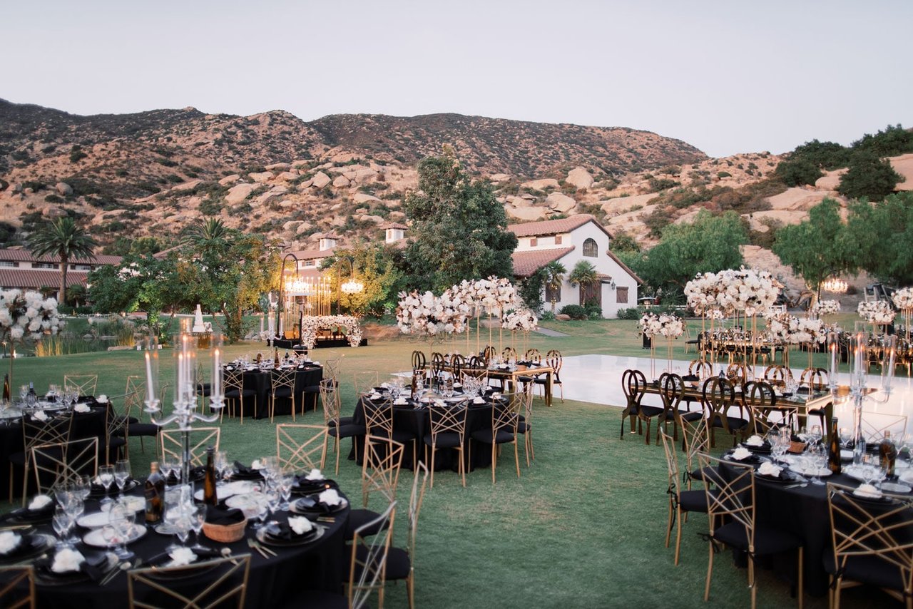 Glam, Modern Outdoor Ranch Wedding with Black + Gold Décor